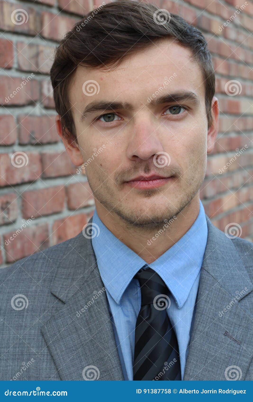 Striking Businessman with Neutral Expression Close Up Stock Photo ...