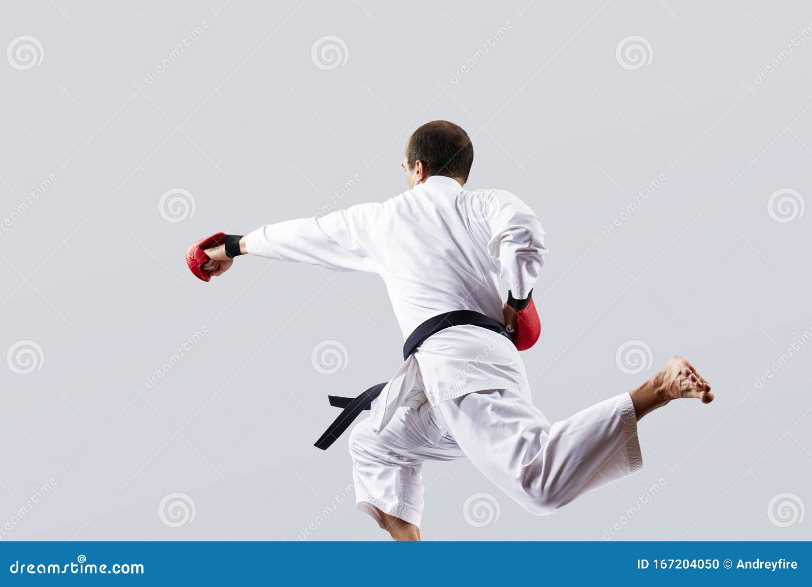 Striking a Hand in a Jump in the Performance of an Athlete in a White ...