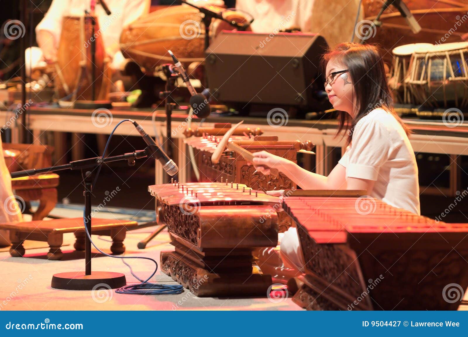 Striking the Saron in Santai Editorial Photography - Image of happiness ...