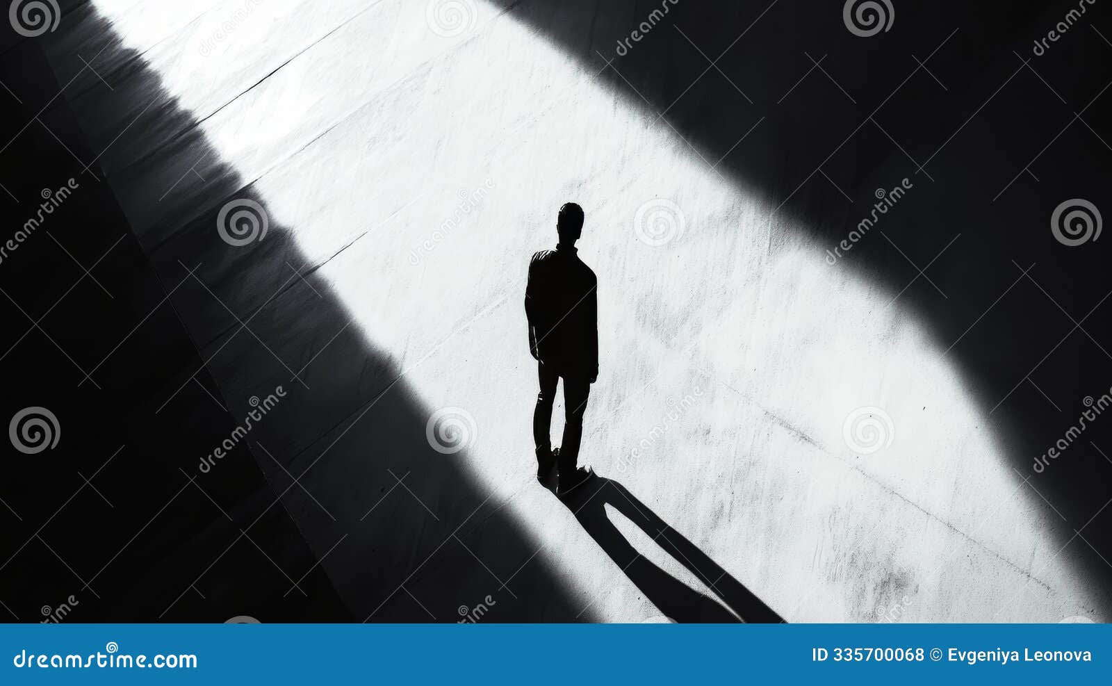 Striking Silhouette of a Man in Bright Light, Casting Dramatic Shadows ...