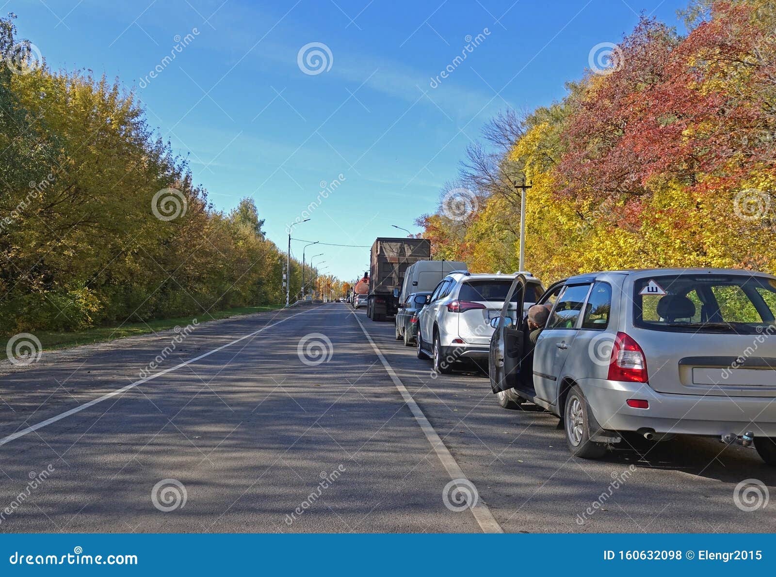A String of Cars before the Railway Crossing Editorial Stock Photo ...