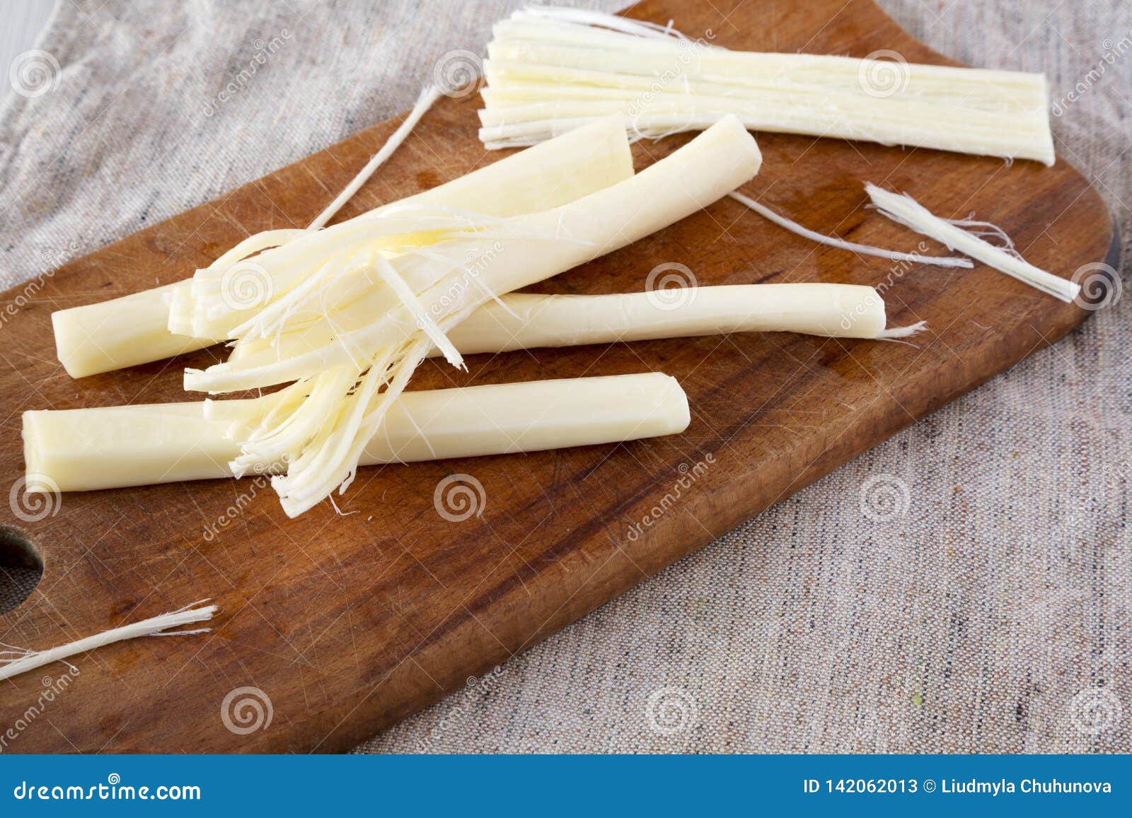 String Cheese on Rustic Wooden Board, Low Angle View. Healthy Snack ...