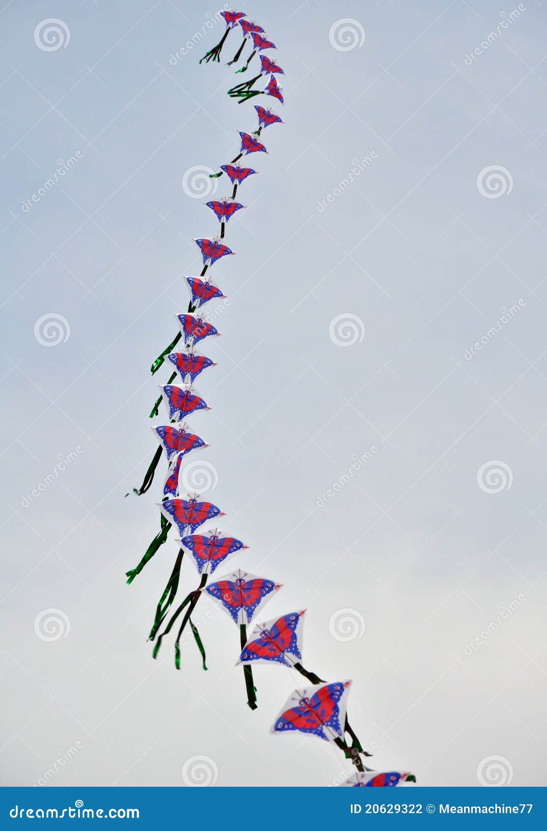 A String of Colorful Chinese Kites before Blue Sky Stock Photo - Image ...