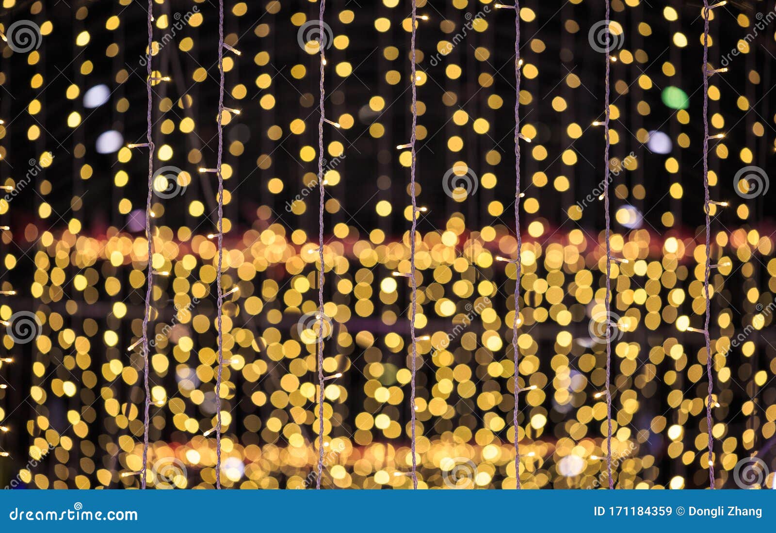 String of Light Bulbs on Yellow Abstract Background View Stock Image ...