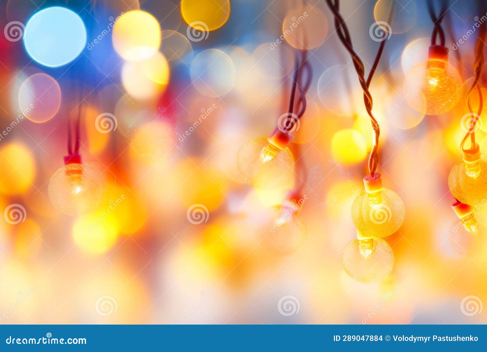 String of Lights that are Hanging from Tree Branch with Blurry ...
