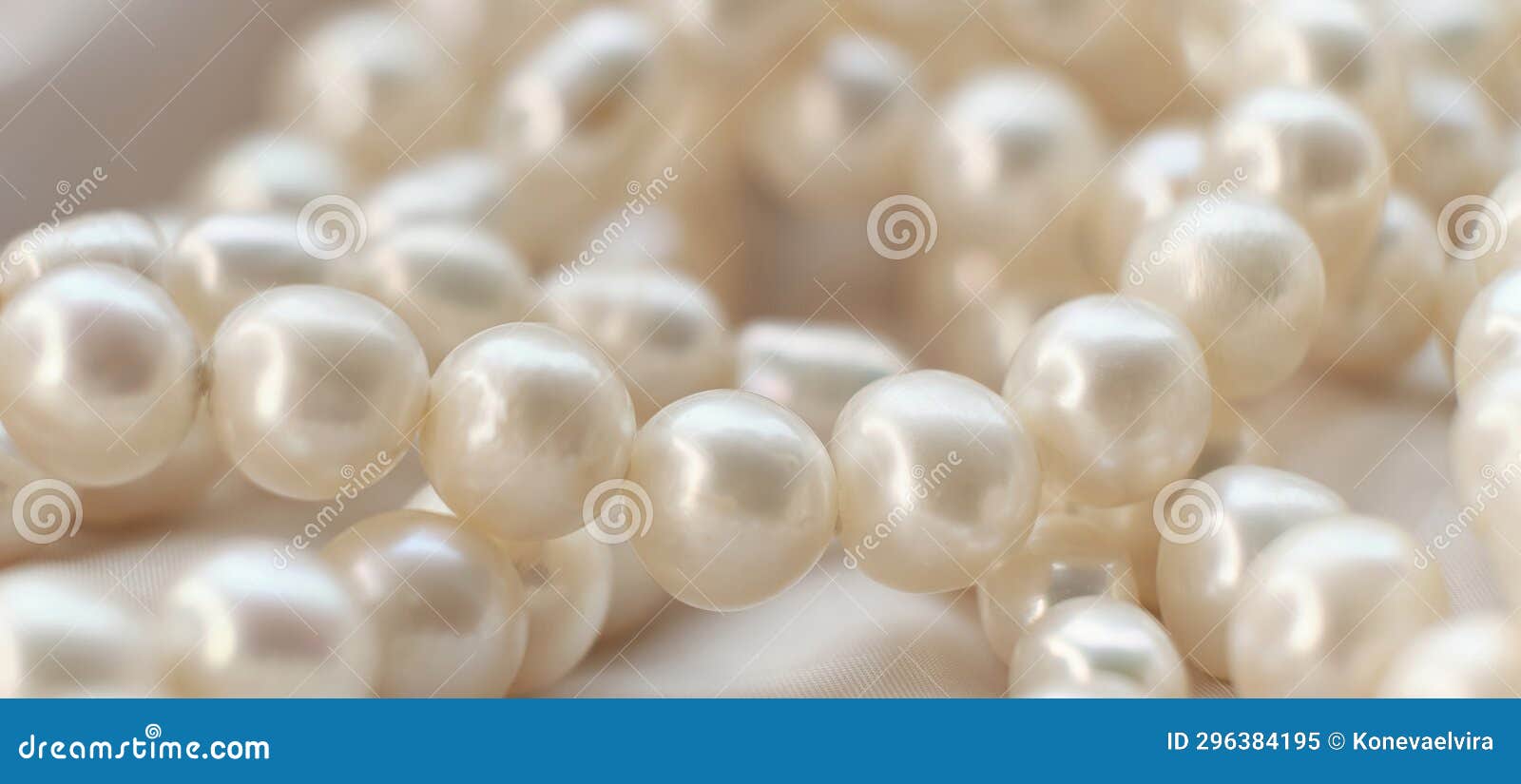 A String of Pearls Gracefully Rests on a White Backdrop, Blurring ...