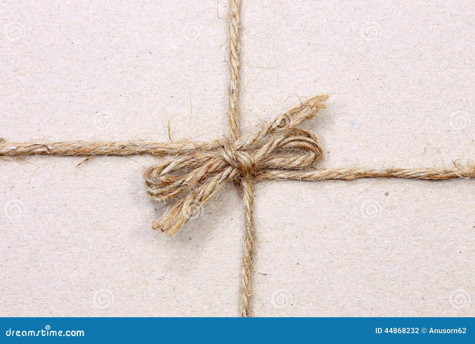 On String Tied in a Bow Brown Recycled Paper Stock Photo - Image of ...