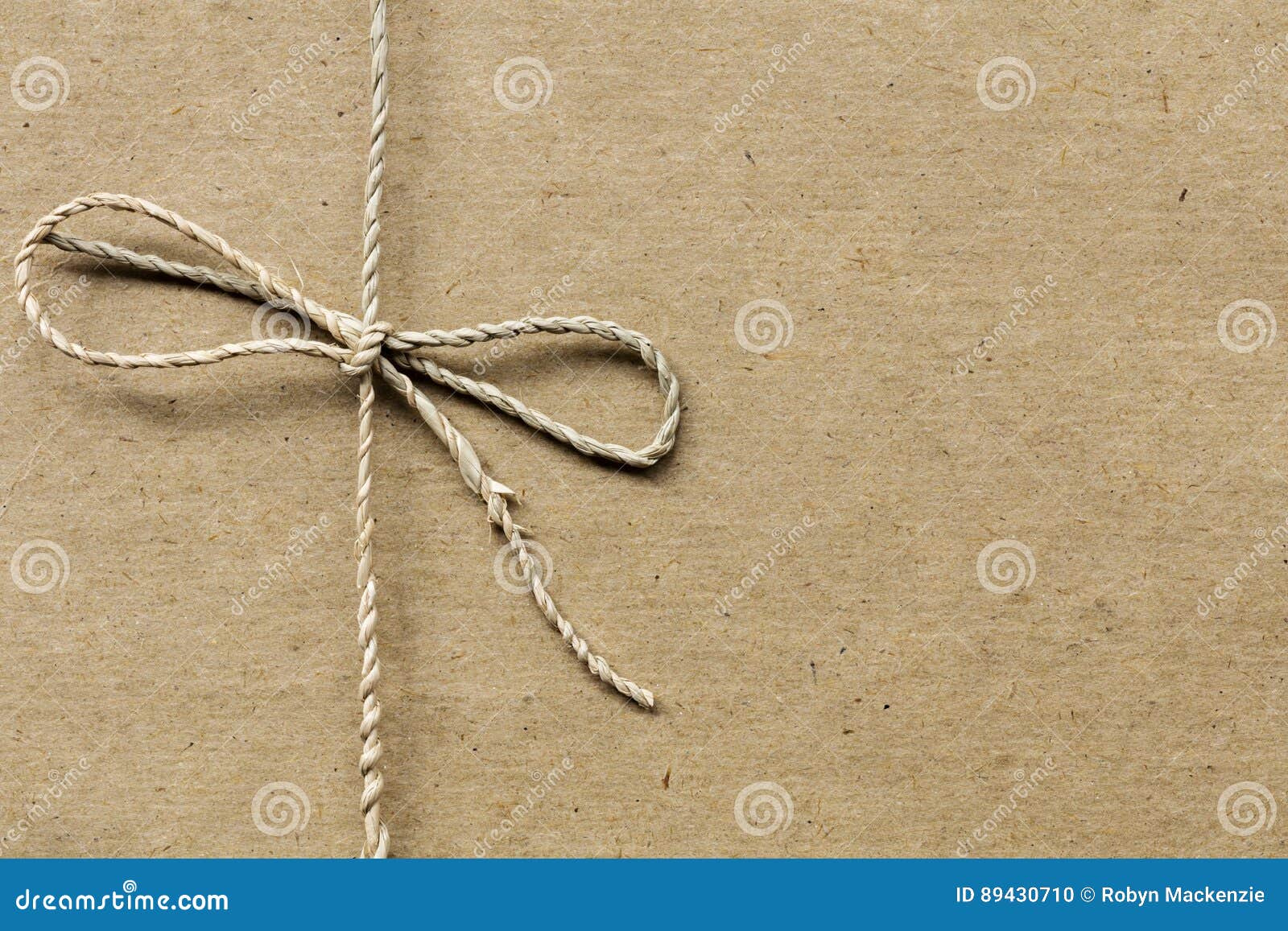 String Tied on Recycled Paper Stock Photo - Image of package, textured ...
