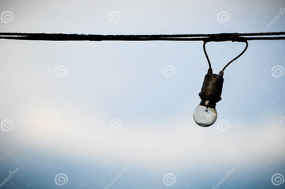 String Wired of Bulb on Blue Sky Background Stock Image - Image of ...