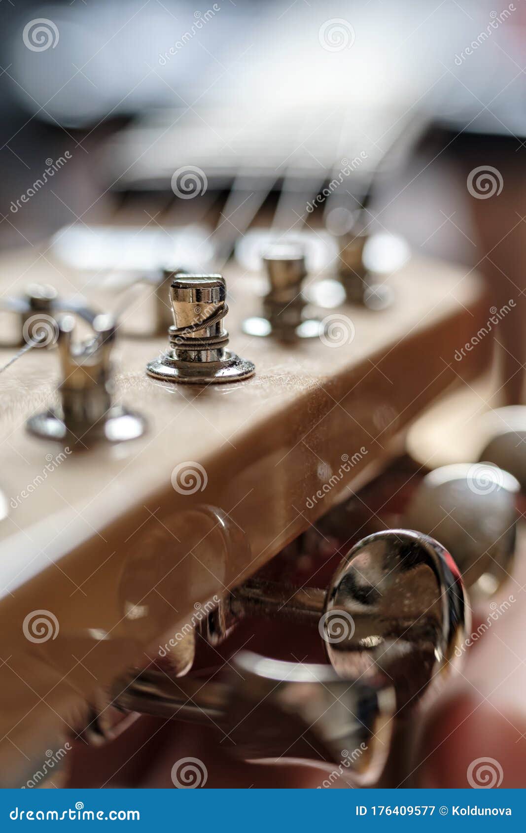 String Wound on a Peg, Close-up, on the Headstock of an Old Wooden ...