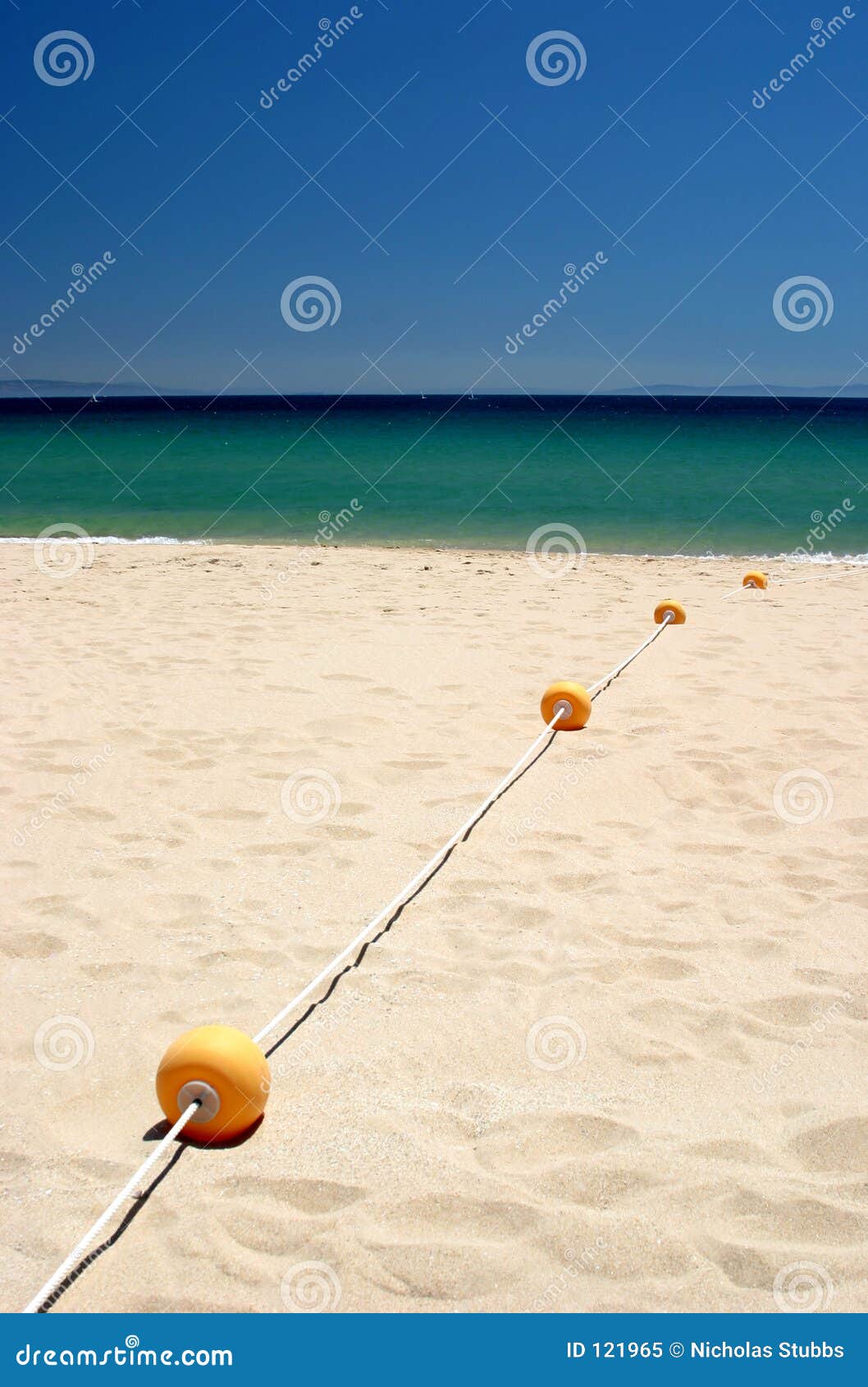 String of Yellow Buoys on Sunny, Sandy Beach Stock Image - Image of ...
