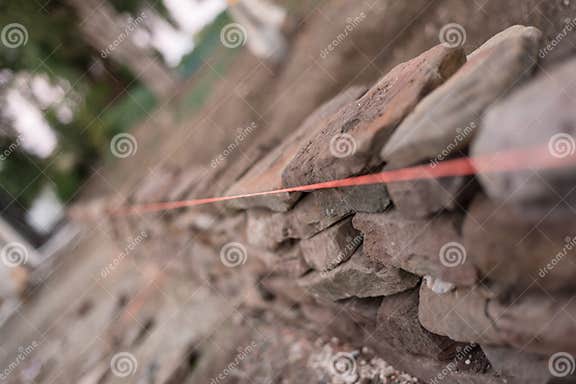 Stringline in the garden stock image. Image of measuring - 42085679