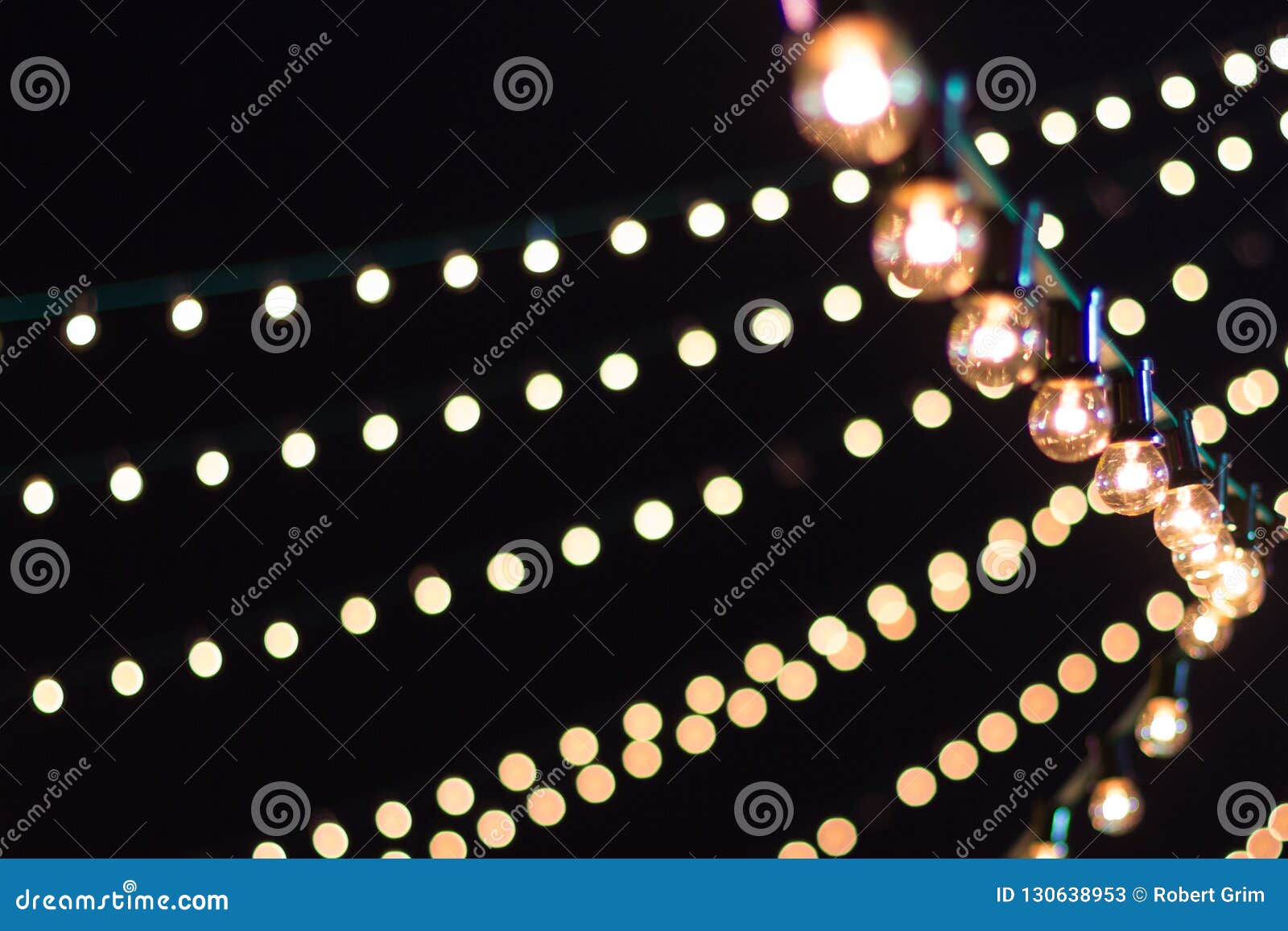 Strings of Festival Lights Against a Black Sky Stock Image - Image of ...