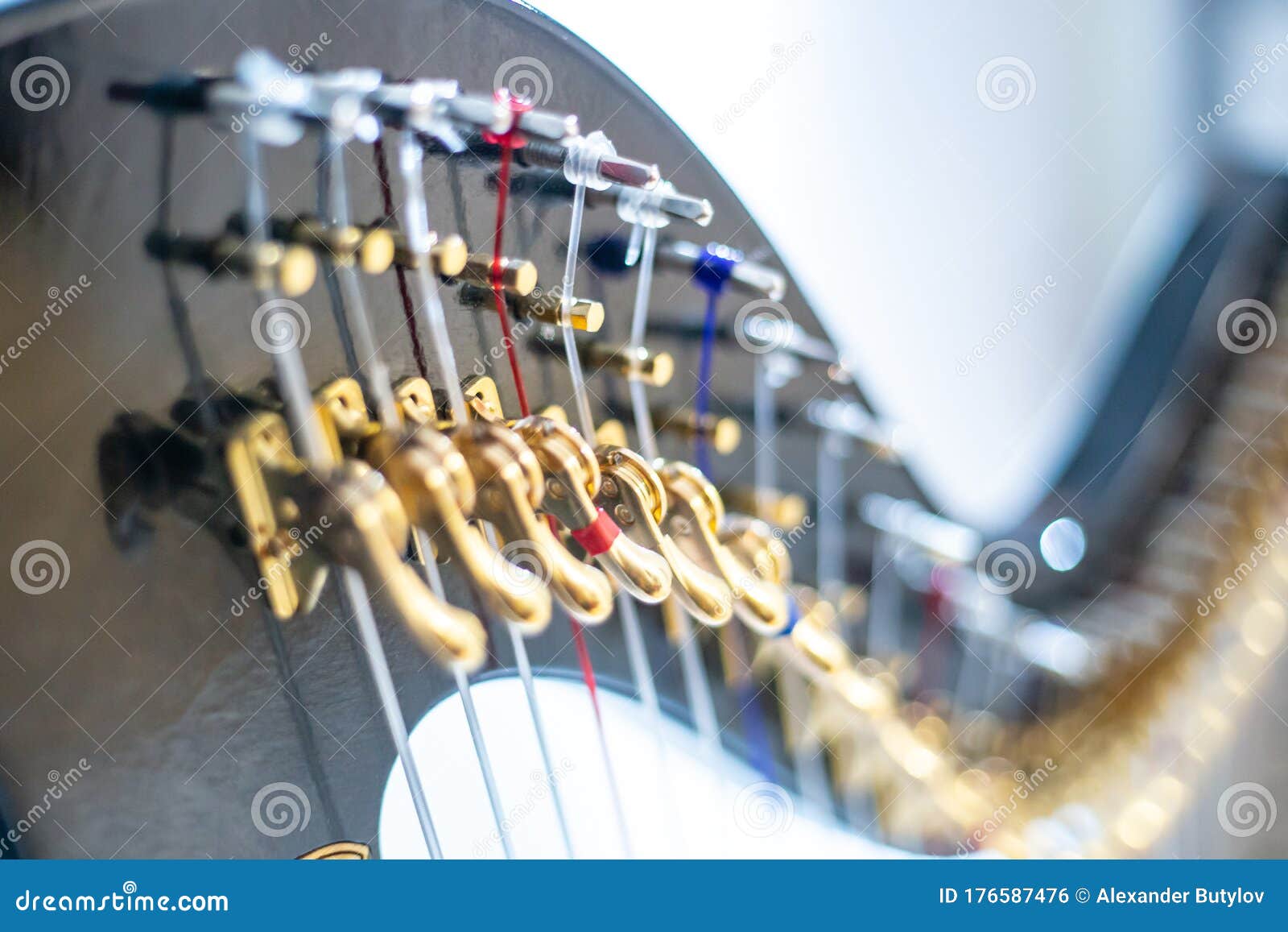The Strings of the Harp Close-up on a Blue Background Stock Photo ...