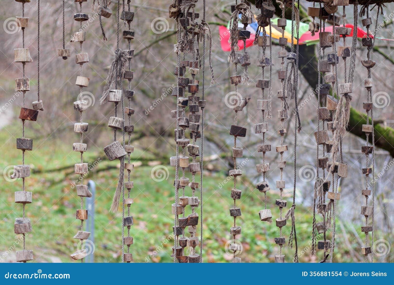 .Strings Made of Pieces of Wood, Hung from Tree Branches, Creating an ...