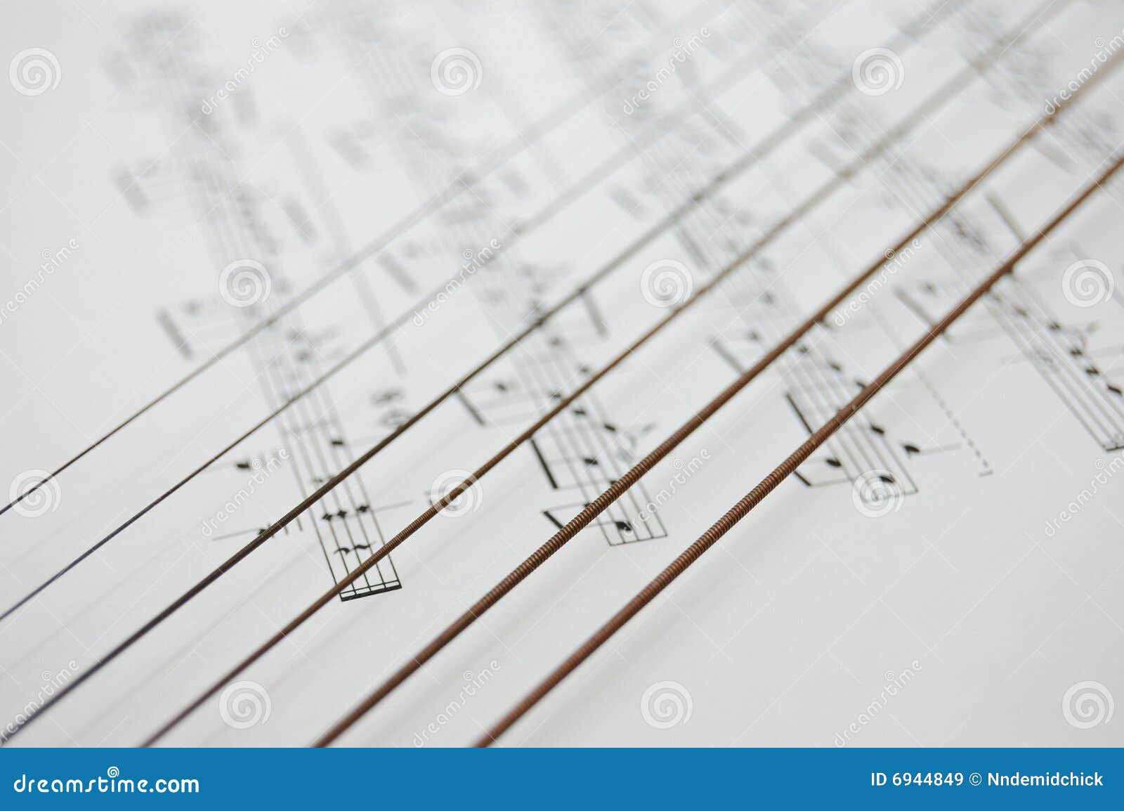 Strings of Musician Instrument Under Notes Stock Image - Image of ...