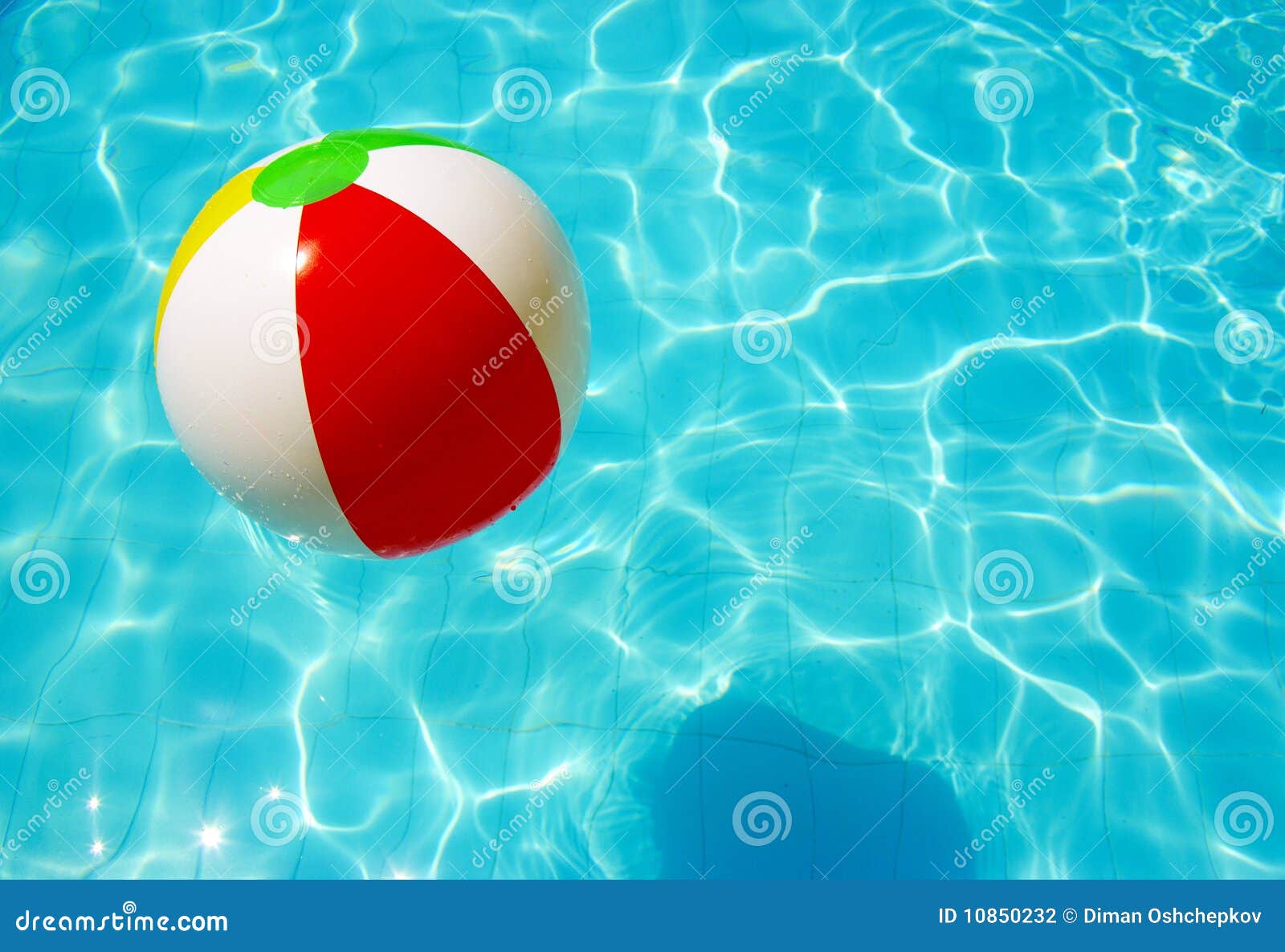 Striped ball in the pool stock photo. Image of multi - 10850232