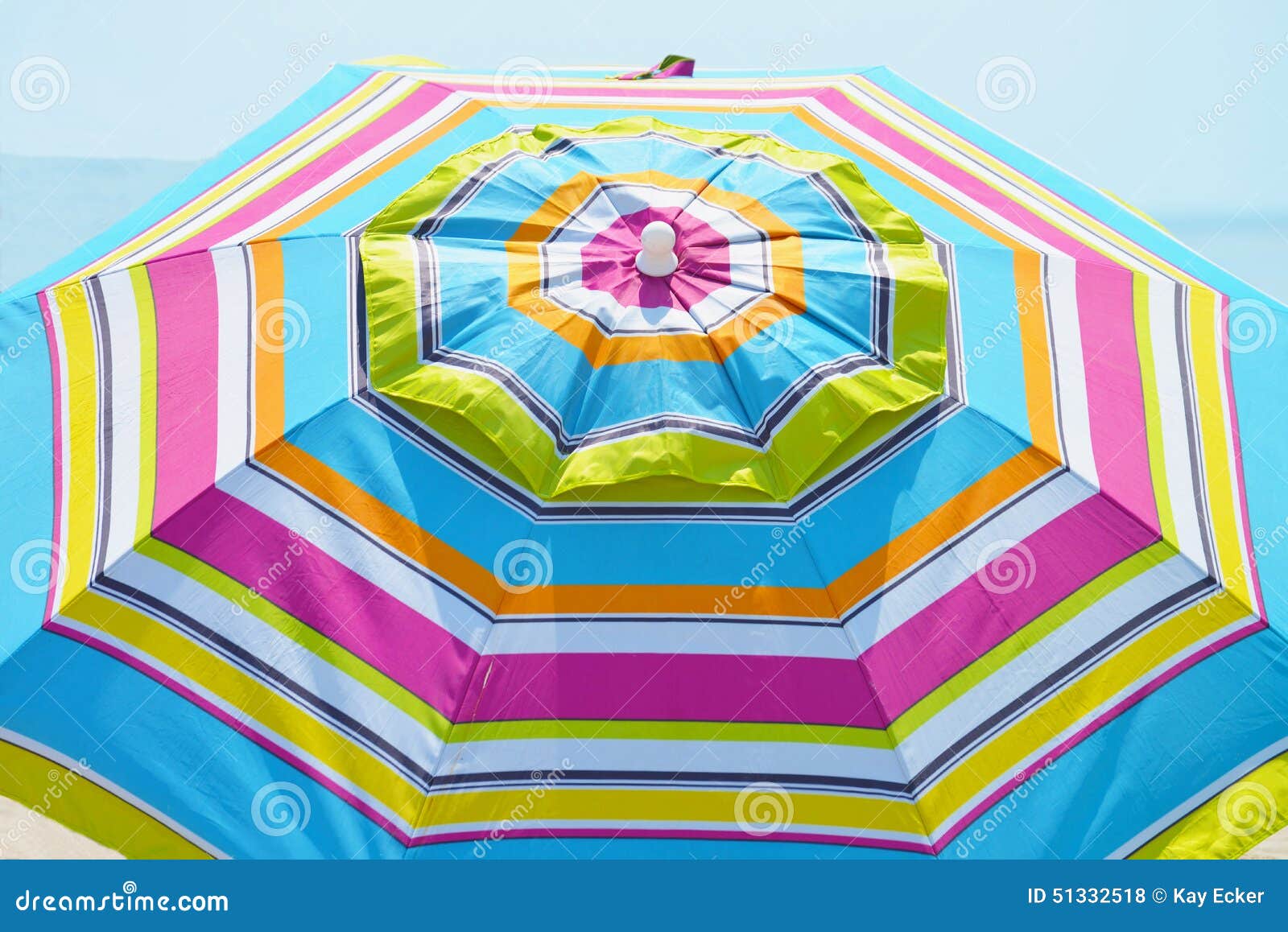 Striped beach umbrella. stock photo. Image of colorful - 51332518