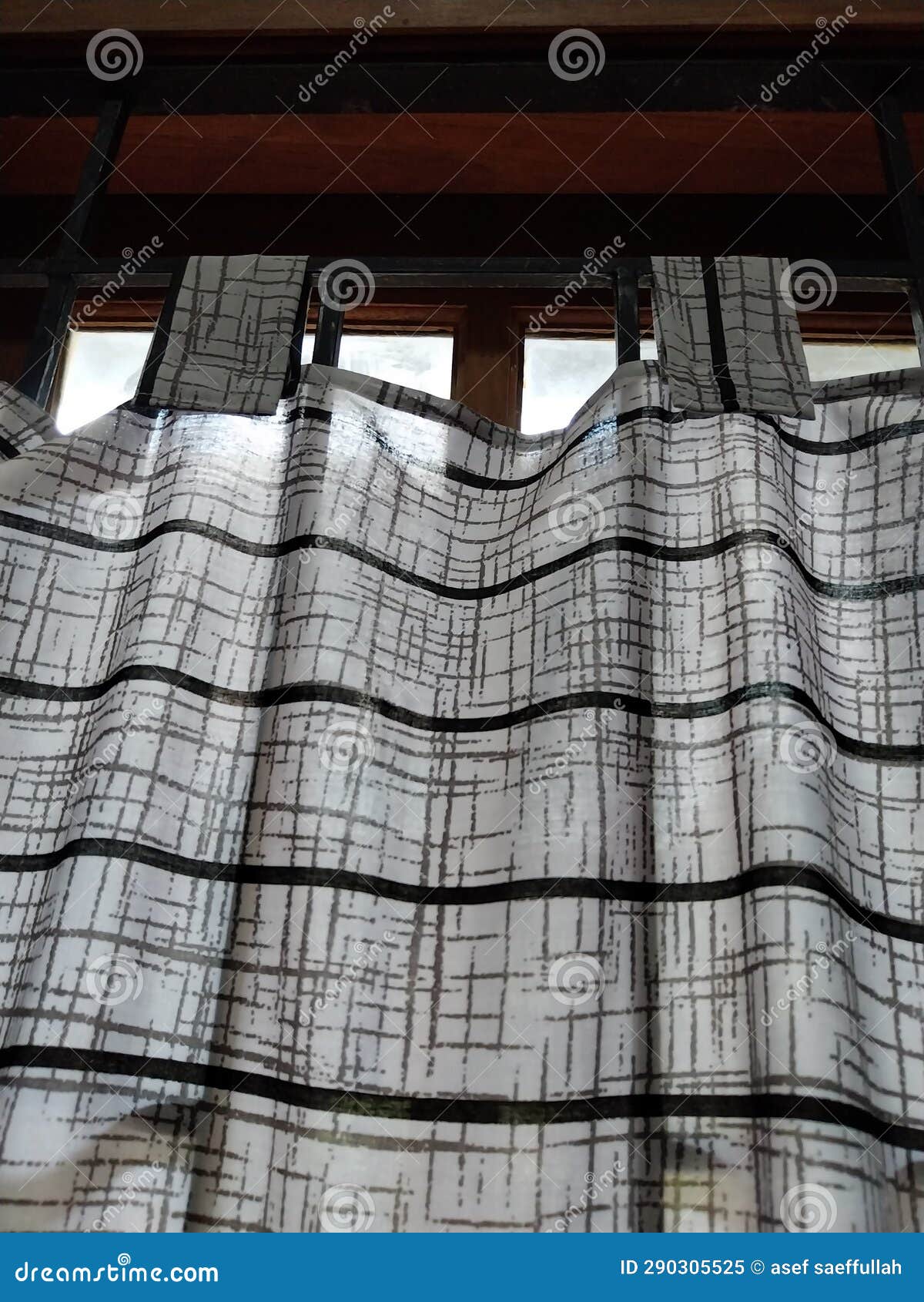 Striped Patterned Fabric with Black Line Silhouettes Behind it Stock ...