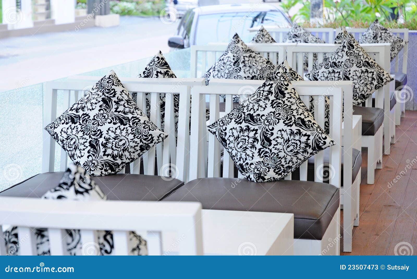 Striped pillow and table stock image. Image of land, chair - 23507473