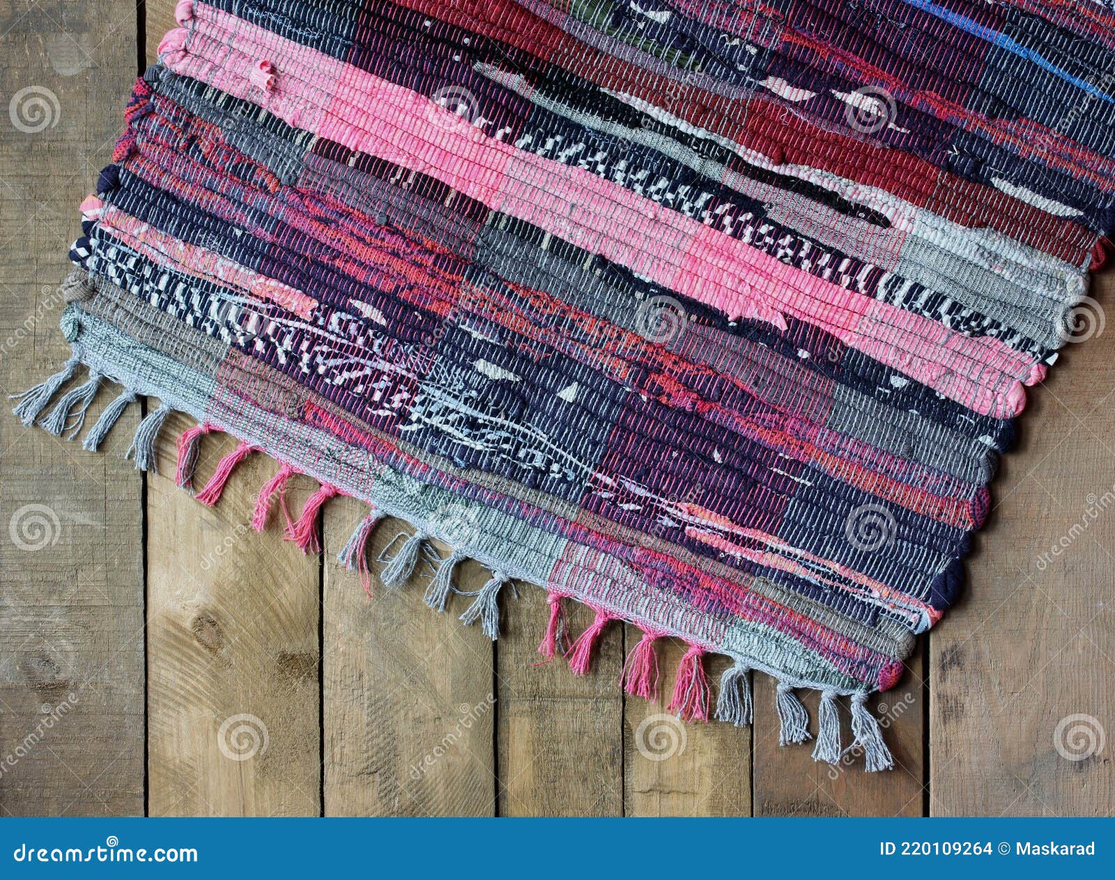 Striped Rustic Rug on the Rough Plank Floor Stock Photo - Image of ...