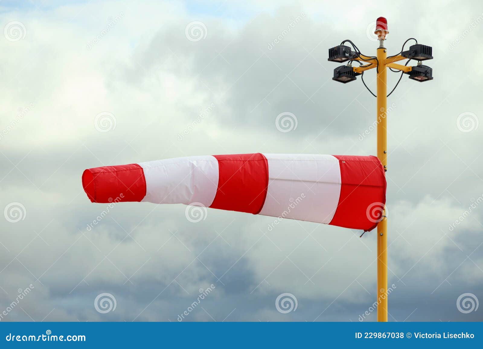 A Striped Weather Vane on a Sky Background Stock Photo - Image of ...