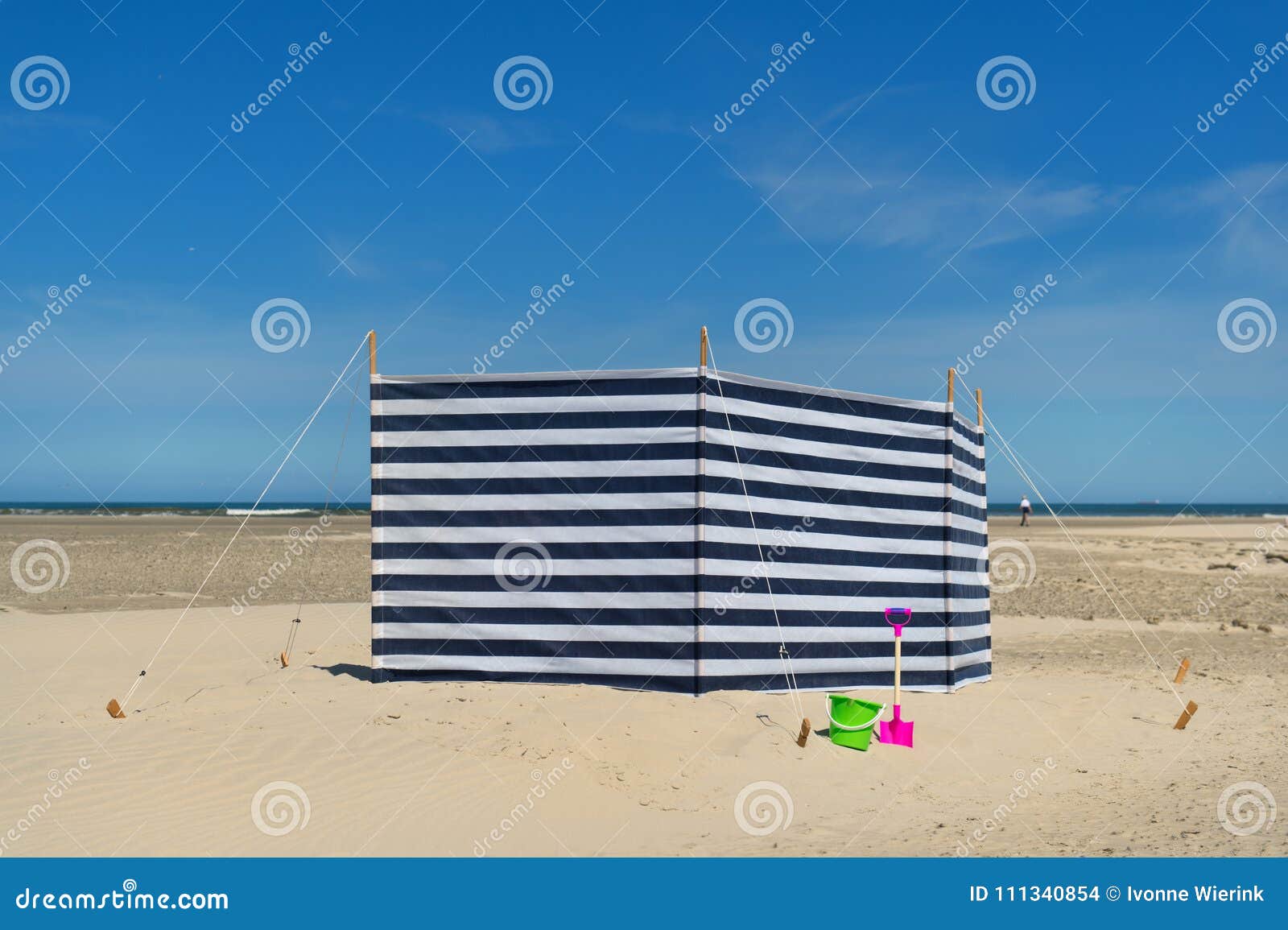 Striped Windbreak at the Beach Stock Photo - Image of beach, wind ...