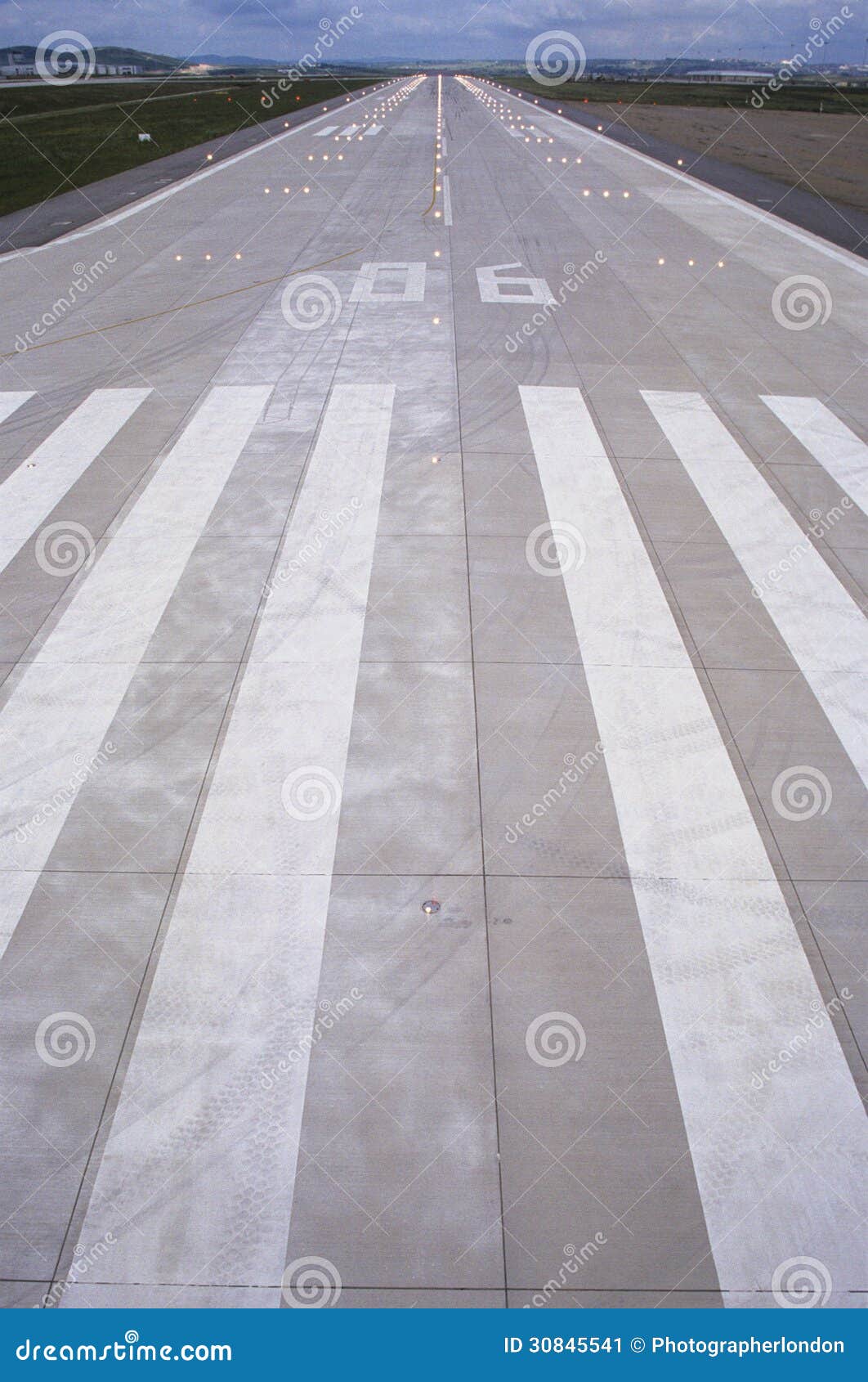 Stripes on Airport Runway stock image. Image of runway - 30845541
