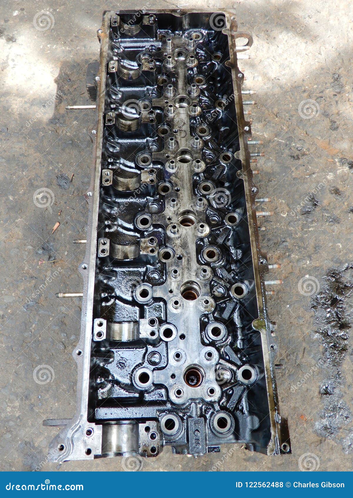Stripped cylinder head stock photo. Image of garage - 122562488