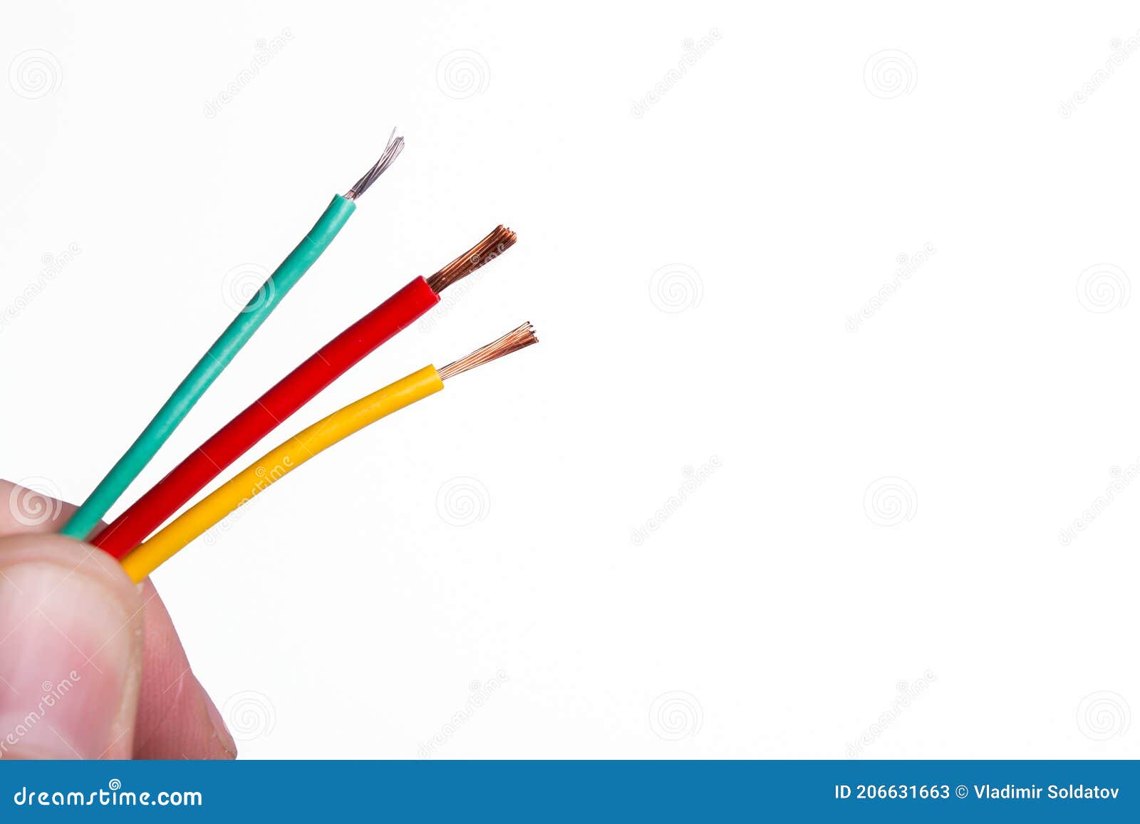 Stripped wires in hand stock image. Image of electricity - 206631663