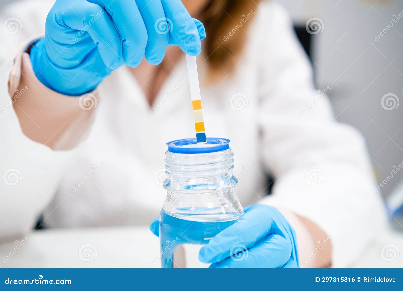 Strips for Measurement of Acidity for PH Test in Scientists Hand Stock ...