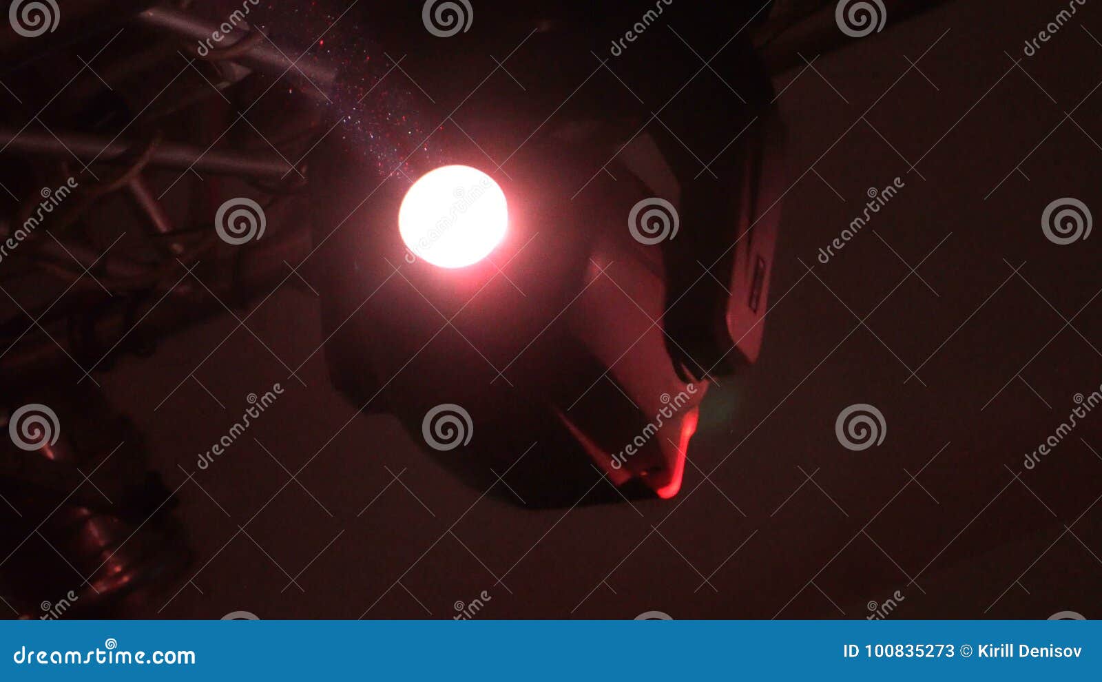 Strobe Lights Emitting Different Color Beams Hanging Under the Ceiling ...