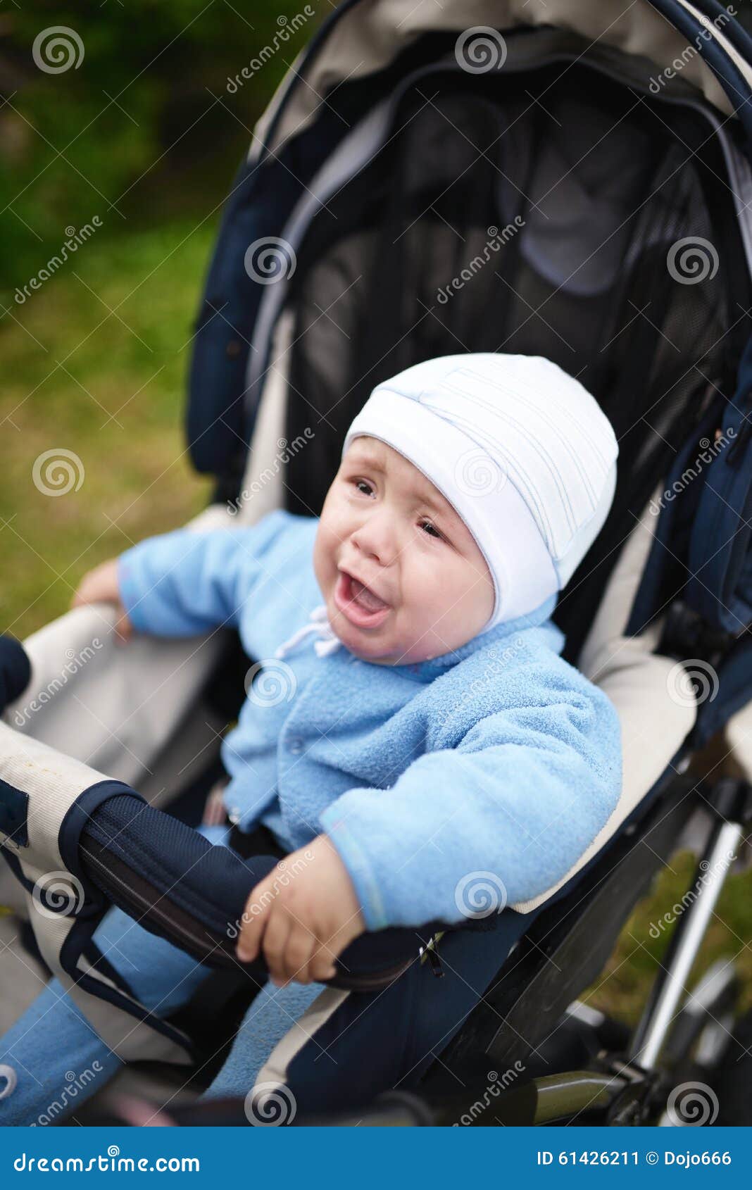 The stroller crying baby stock image. Image of childhood - 61426211