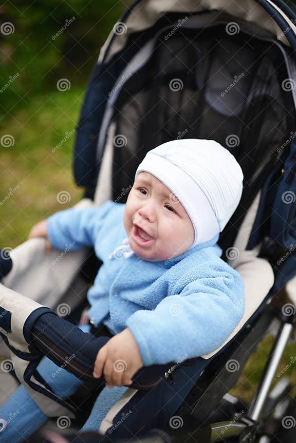 The stroller crying baby stock image. Image of childhood - 61426211