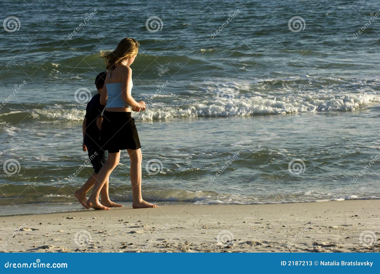 Strolling along the waves stock image. Image of childhood - 2187213