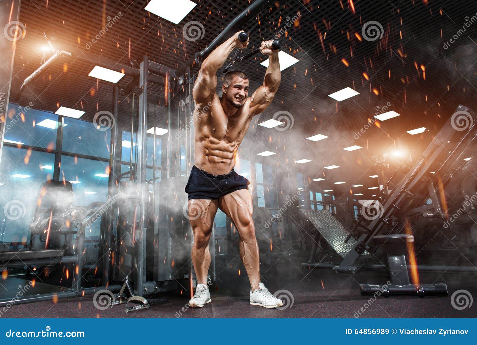 Strong Athletic Man Bodybuilder Showing Muscles in Gym Stock Image ...