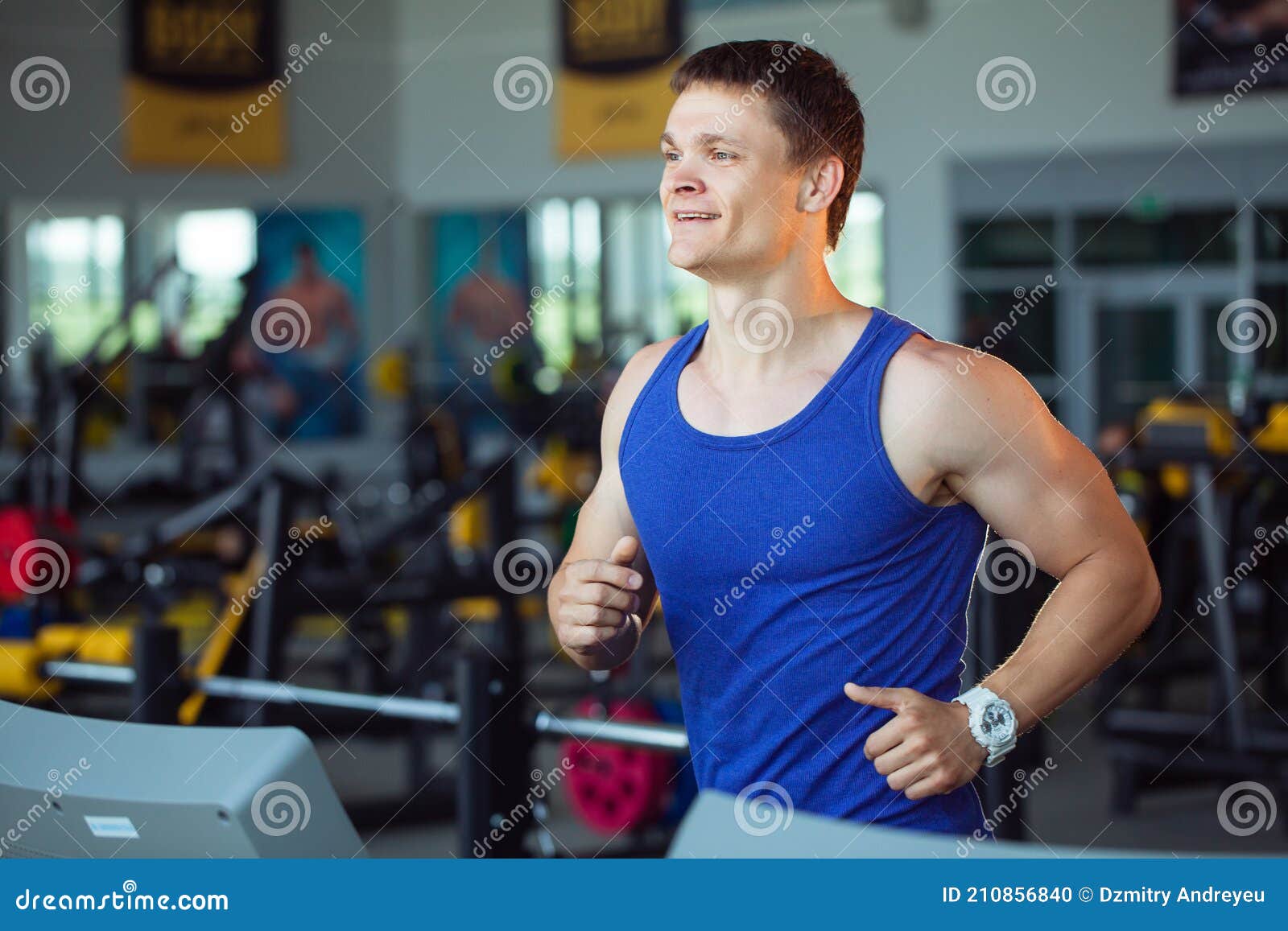 Strong Bodybuilder Exercising in a Gym Stock Photo - Image of cardio ...