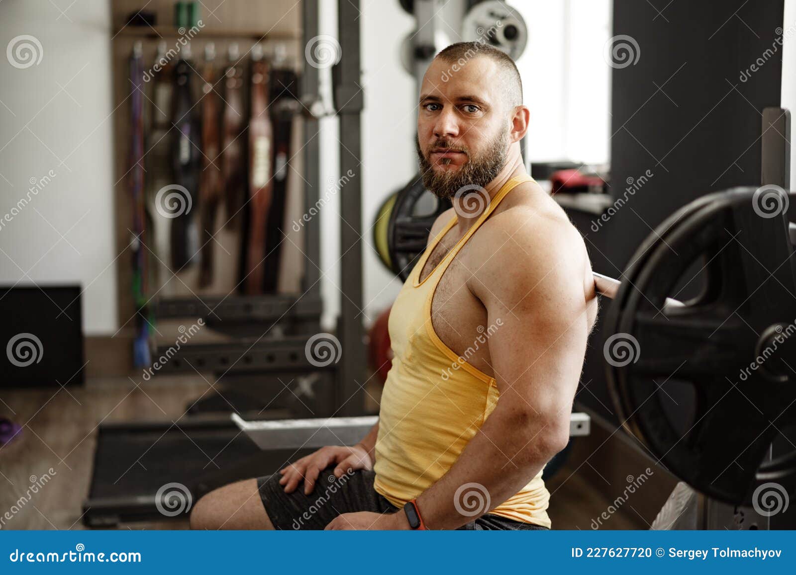Strong Bodybuilder with Muscular Chest and Shoulders in Gym Stock Photo ...