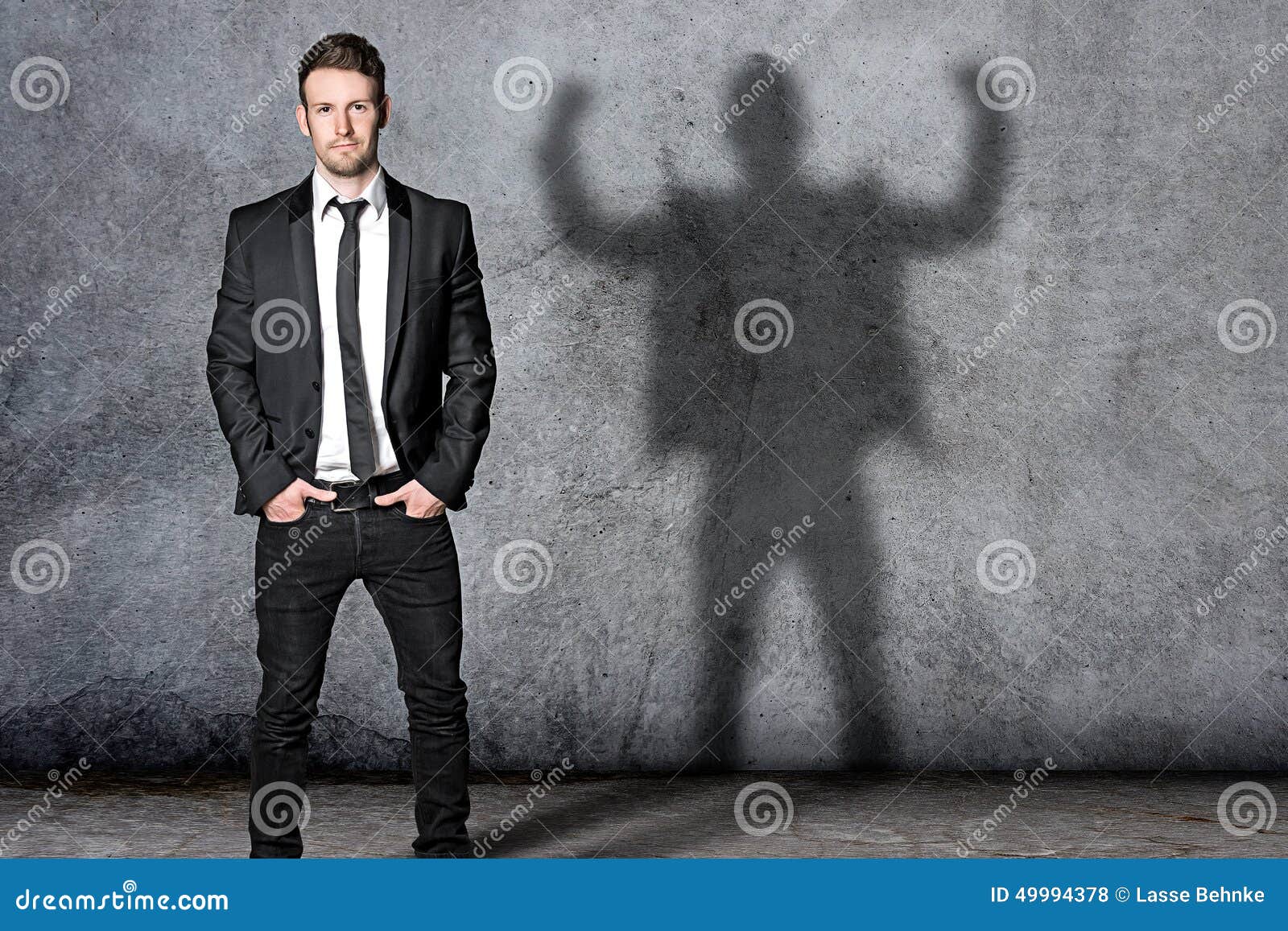 Strong business man stock photo. Image of shadow, muscles - 49994378