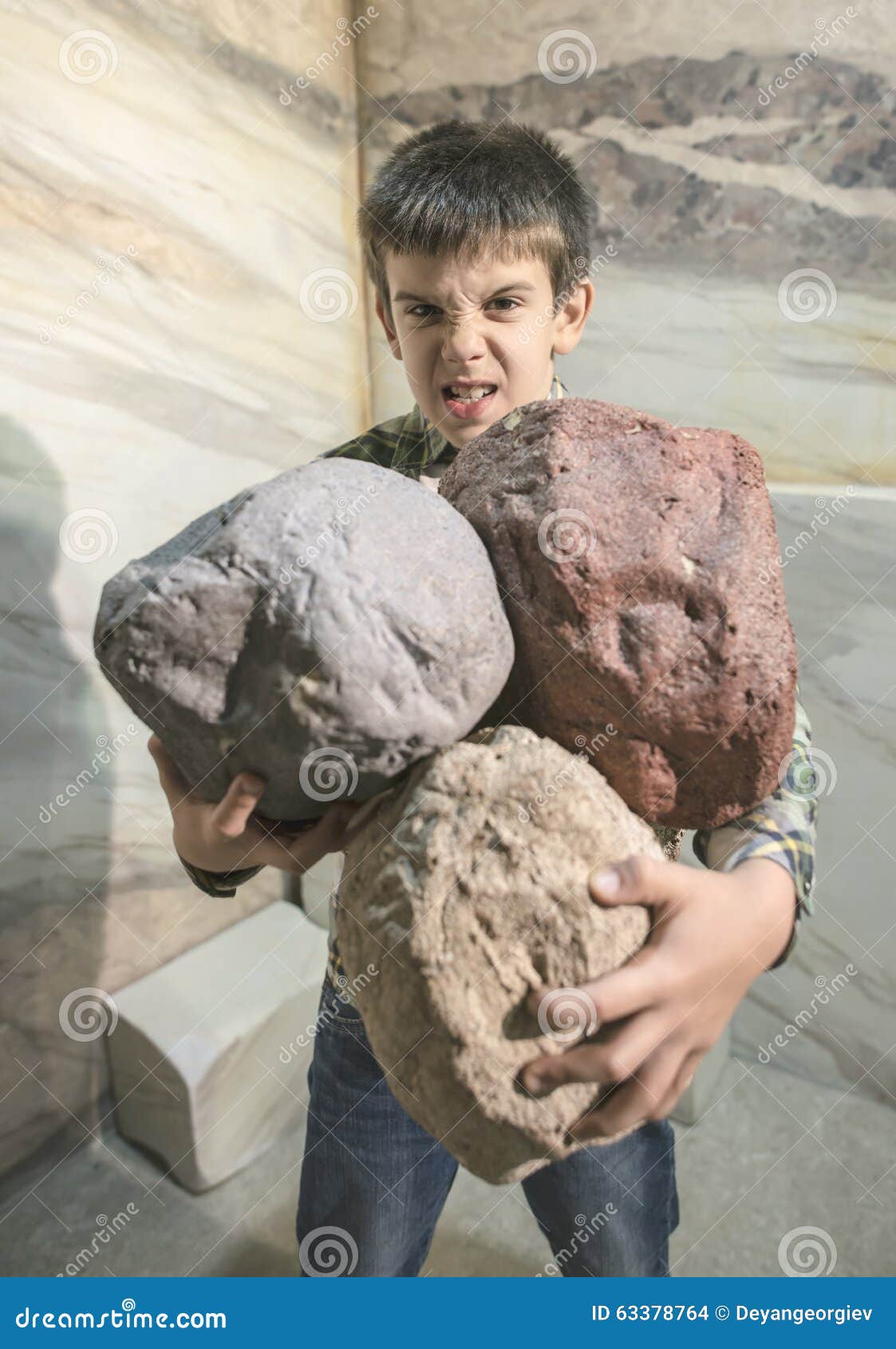 Strong Child Holds Heavy Stones Stock Photo - Image of male, muscular ...
