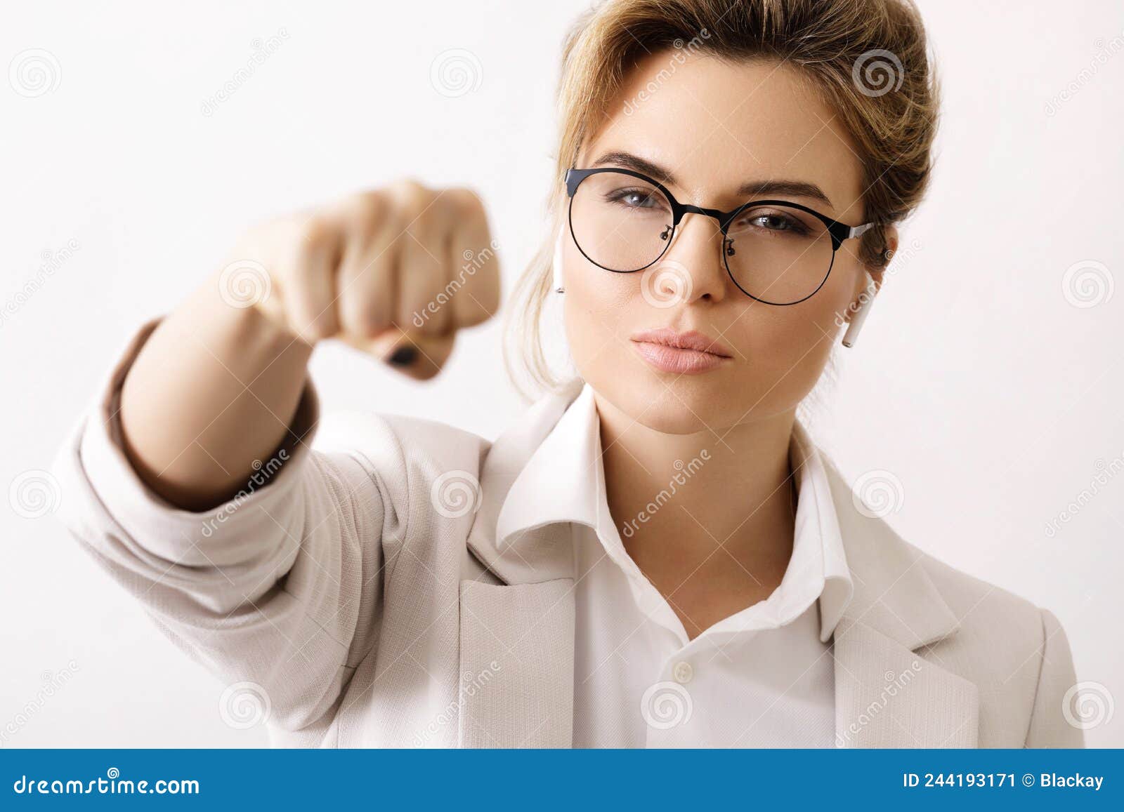 Confident Business Woman Make a Punch into the Camera Stock Image ...