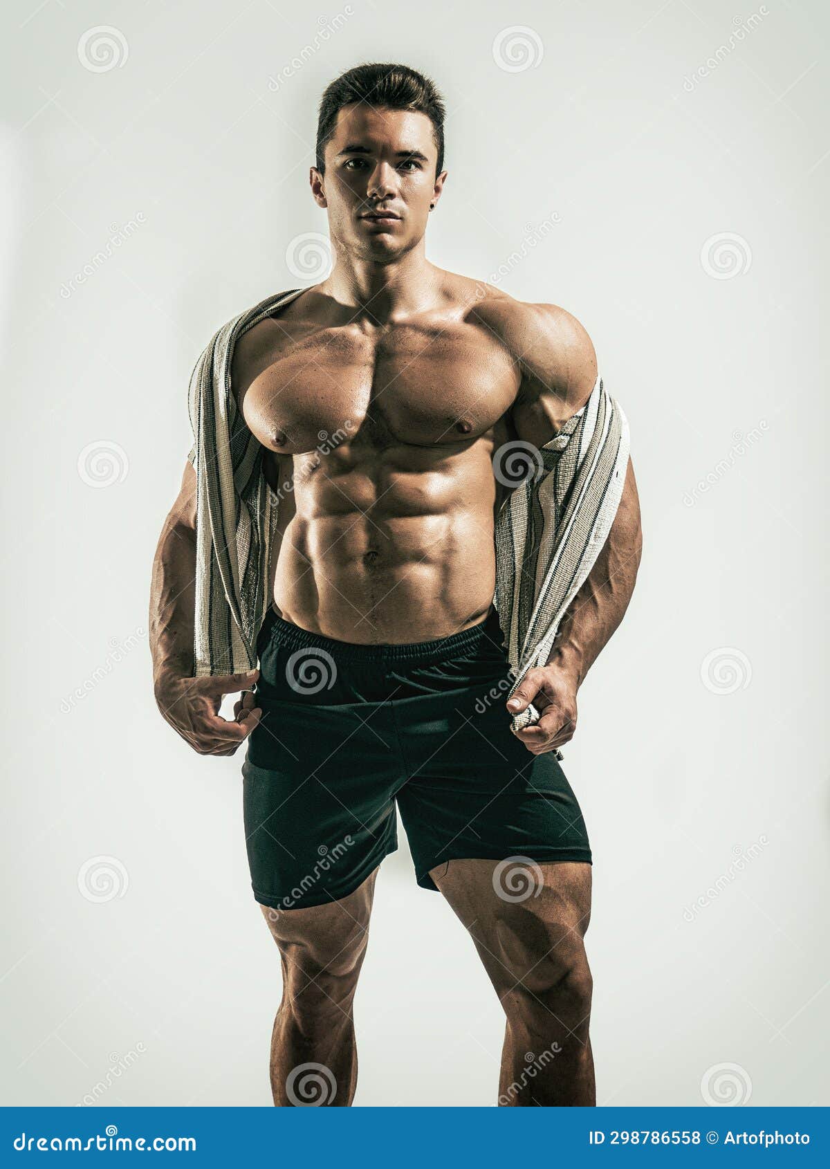 A Strong Display of Masculinity: Flexing Muscles and Striking a Pose ...