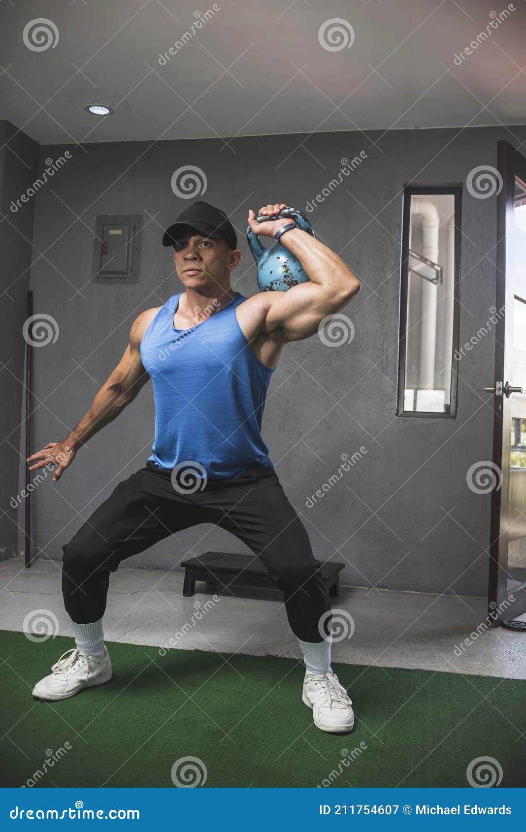 A Strong and Fit, Man Does Kettlebell Overhead Press. Upper Body and ...