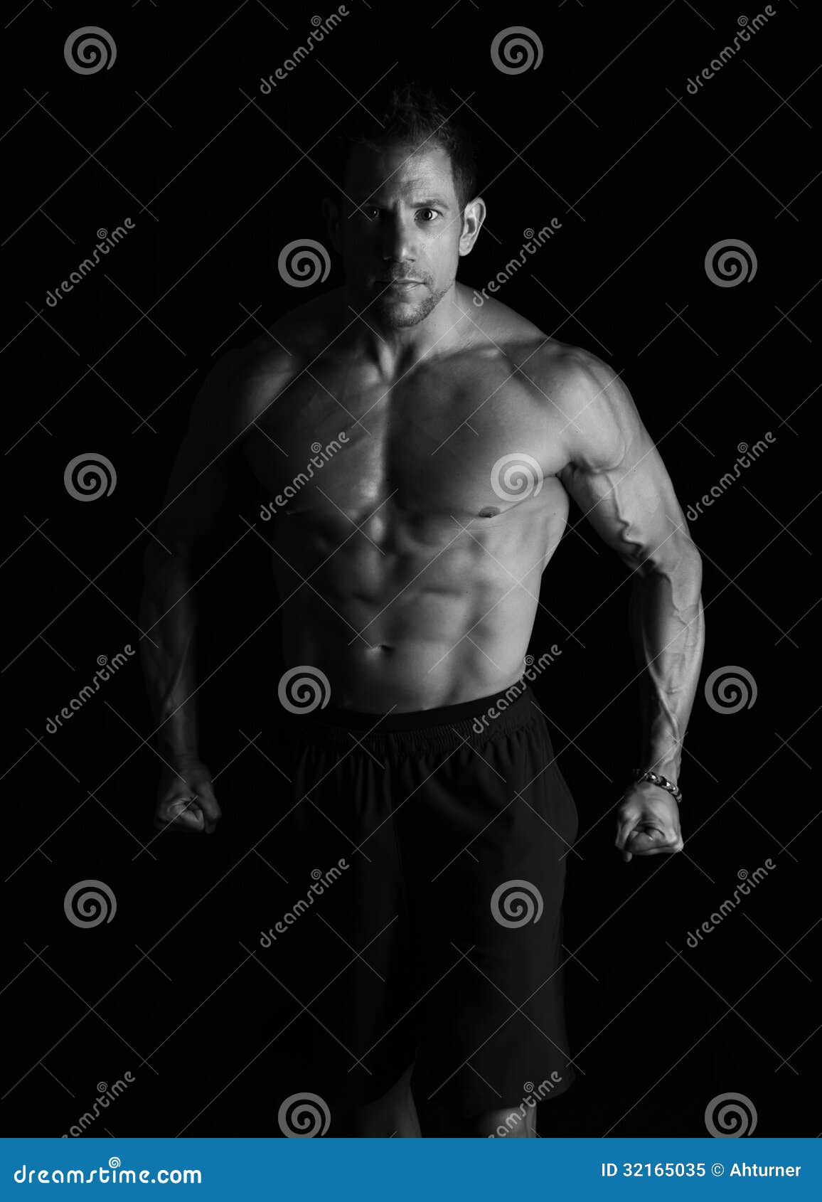 Strong fitness man flexing stock image. Image of hunk - 32165035
