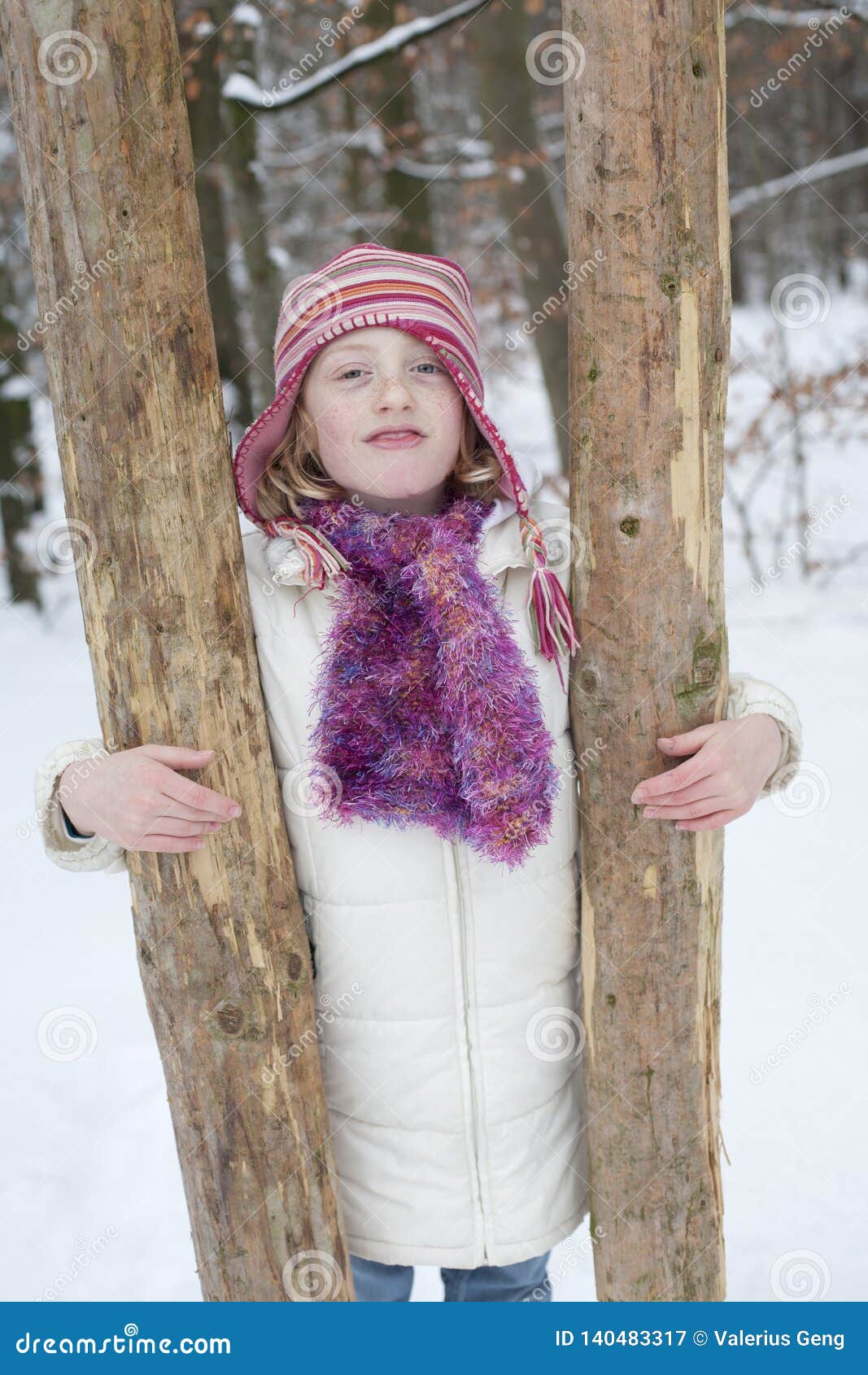 A Strong Girl Holding a Tree Trunk Stock Image - Image of freckles ...