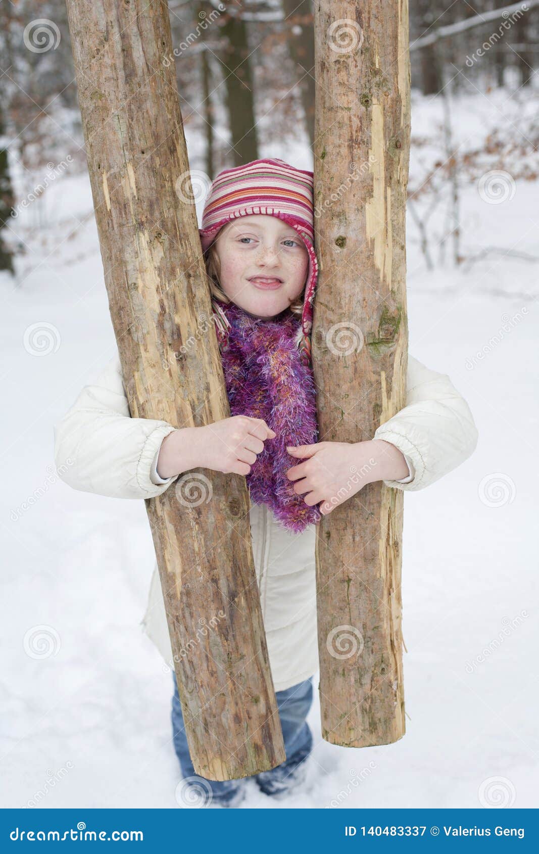 A Strong Girl Holding a Tree Trunk Stock Image - Image of cold ...