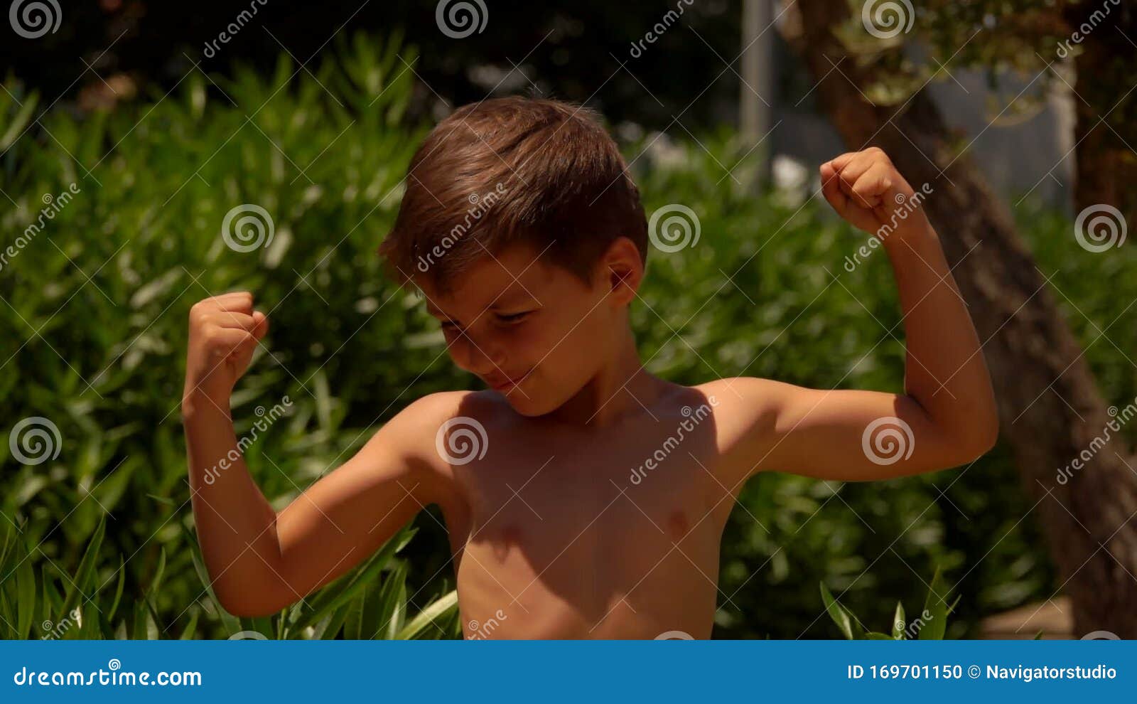 Strong Little Boy Shows His Muscle Stock Footage - Video of biceps ...