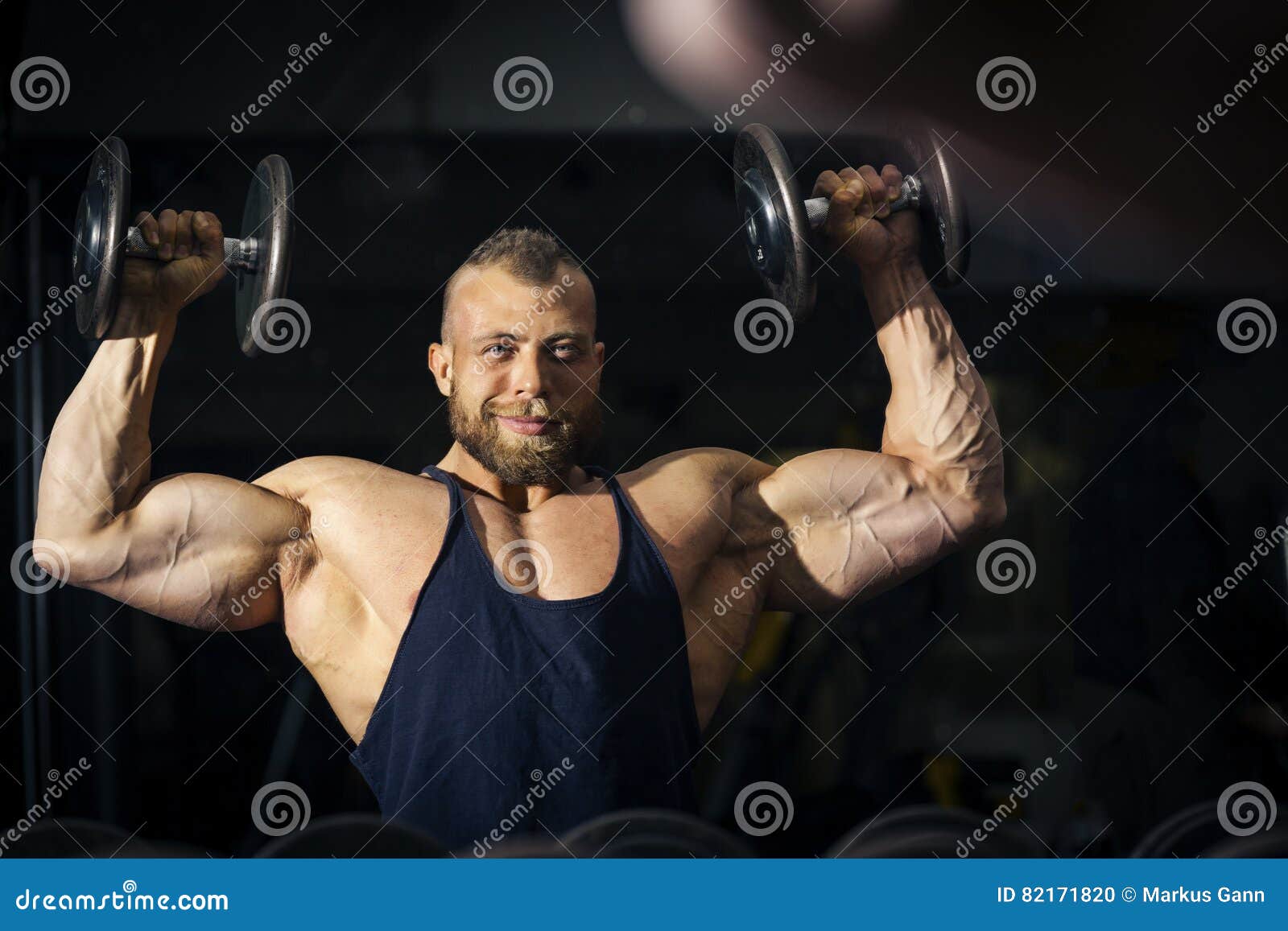 A strong male bodybuilder stock photo. Image of hand - 82171820