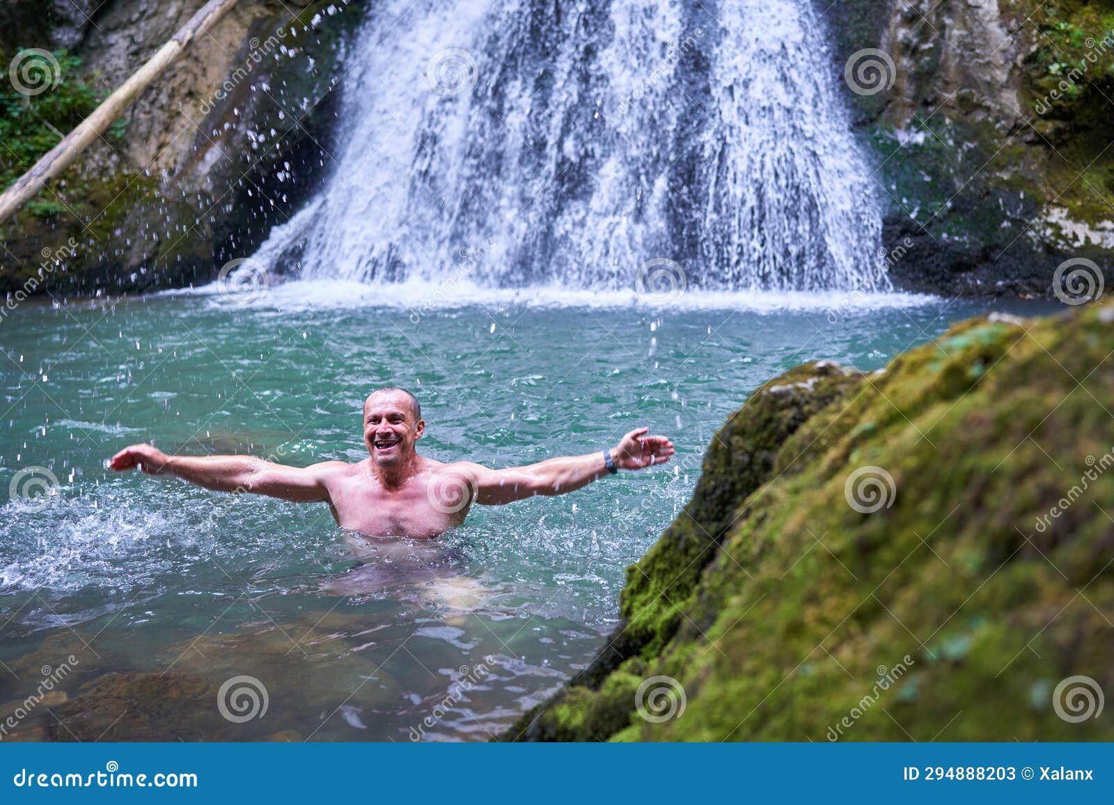 Strong Man Bathing in a Waterfall Stock Image - Image of adventure ...