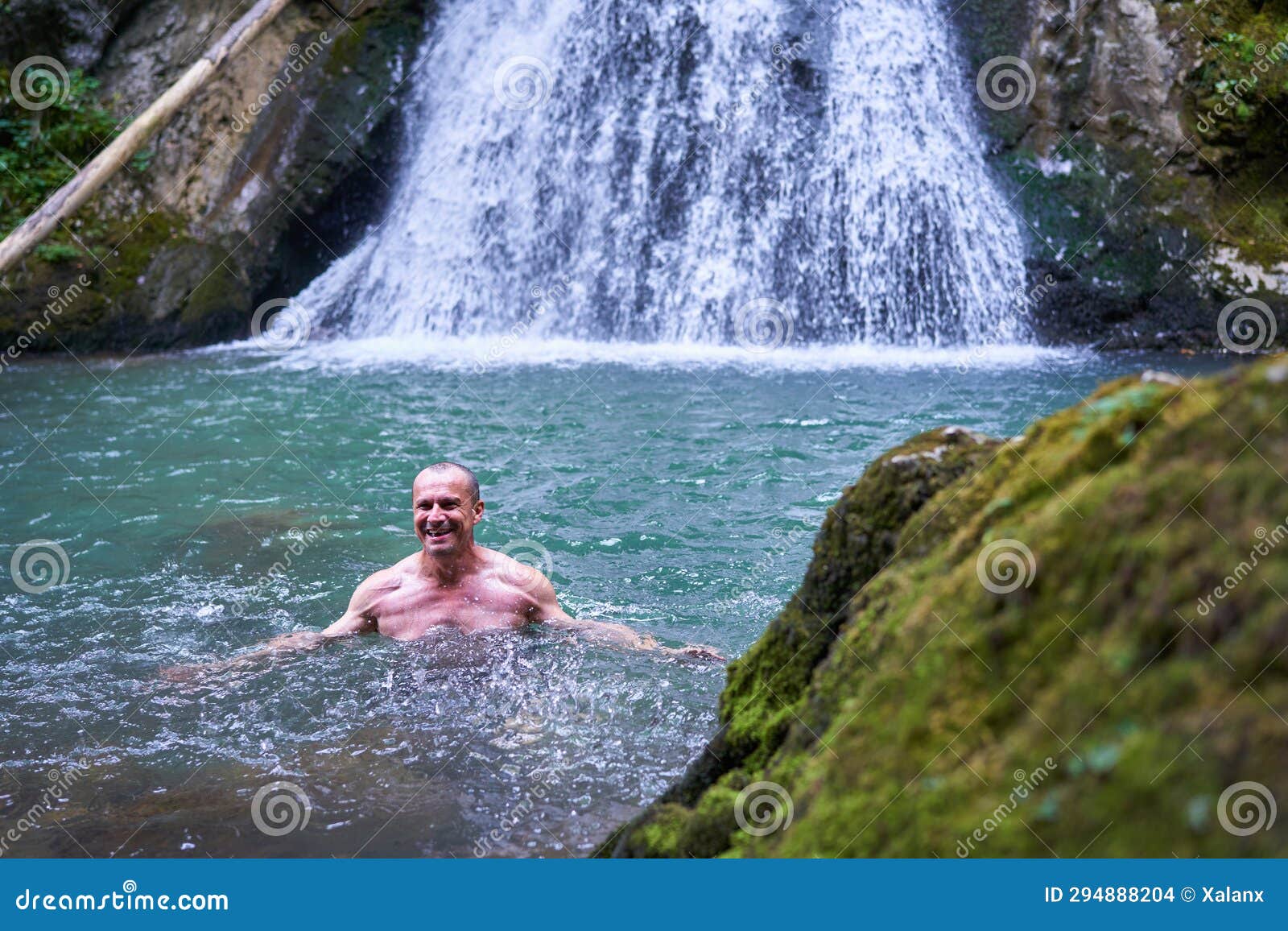 Strong Man Bathing in a Waterfall Stock Photo - Image of cold ...